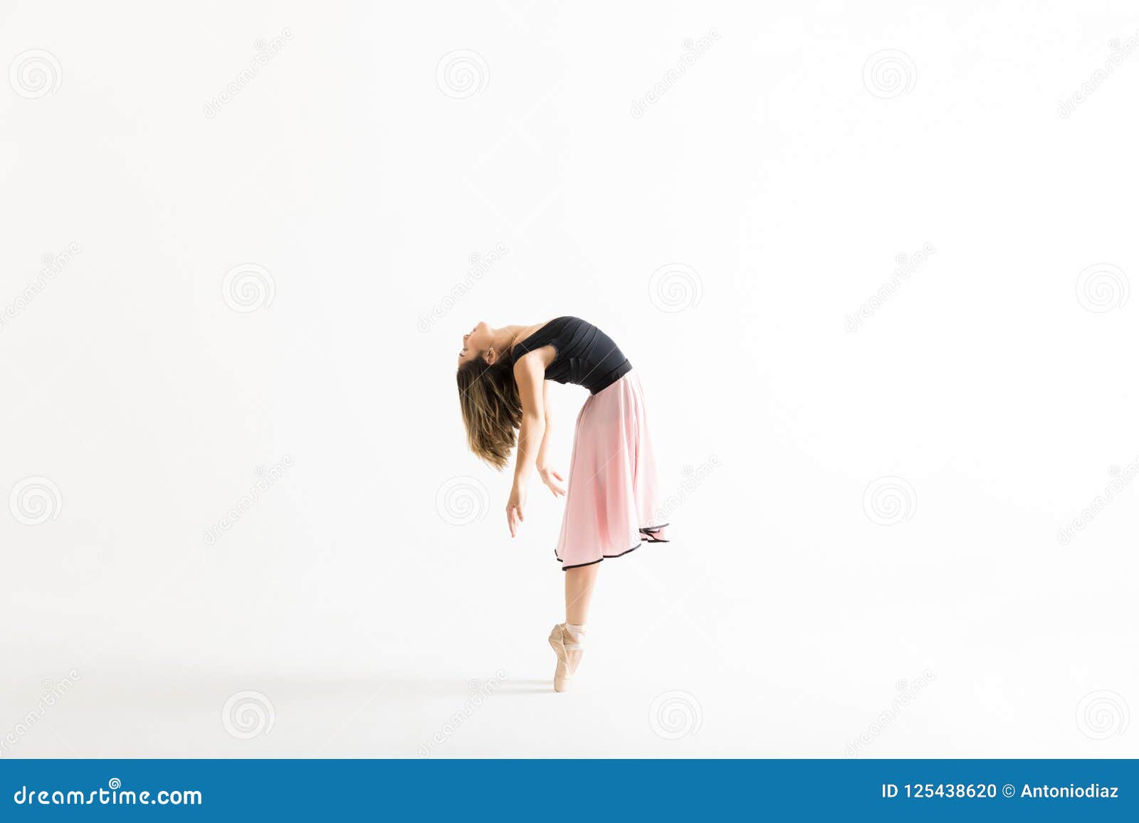 Side View of Female Dancer Posing while Performing Ballet Dance Stock ...