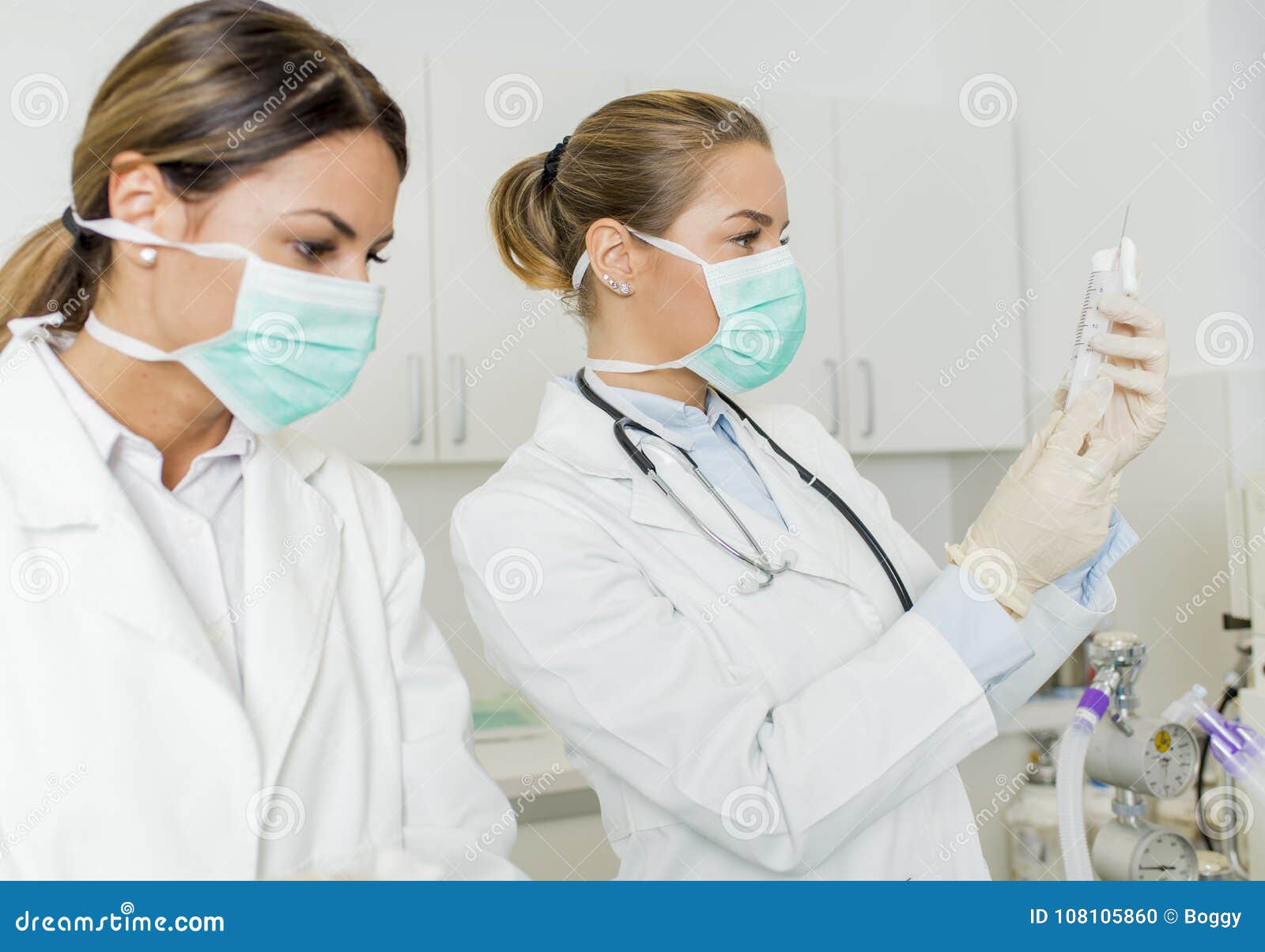 Female Doctors with Injection Stock Photo - Image of safety, care ...