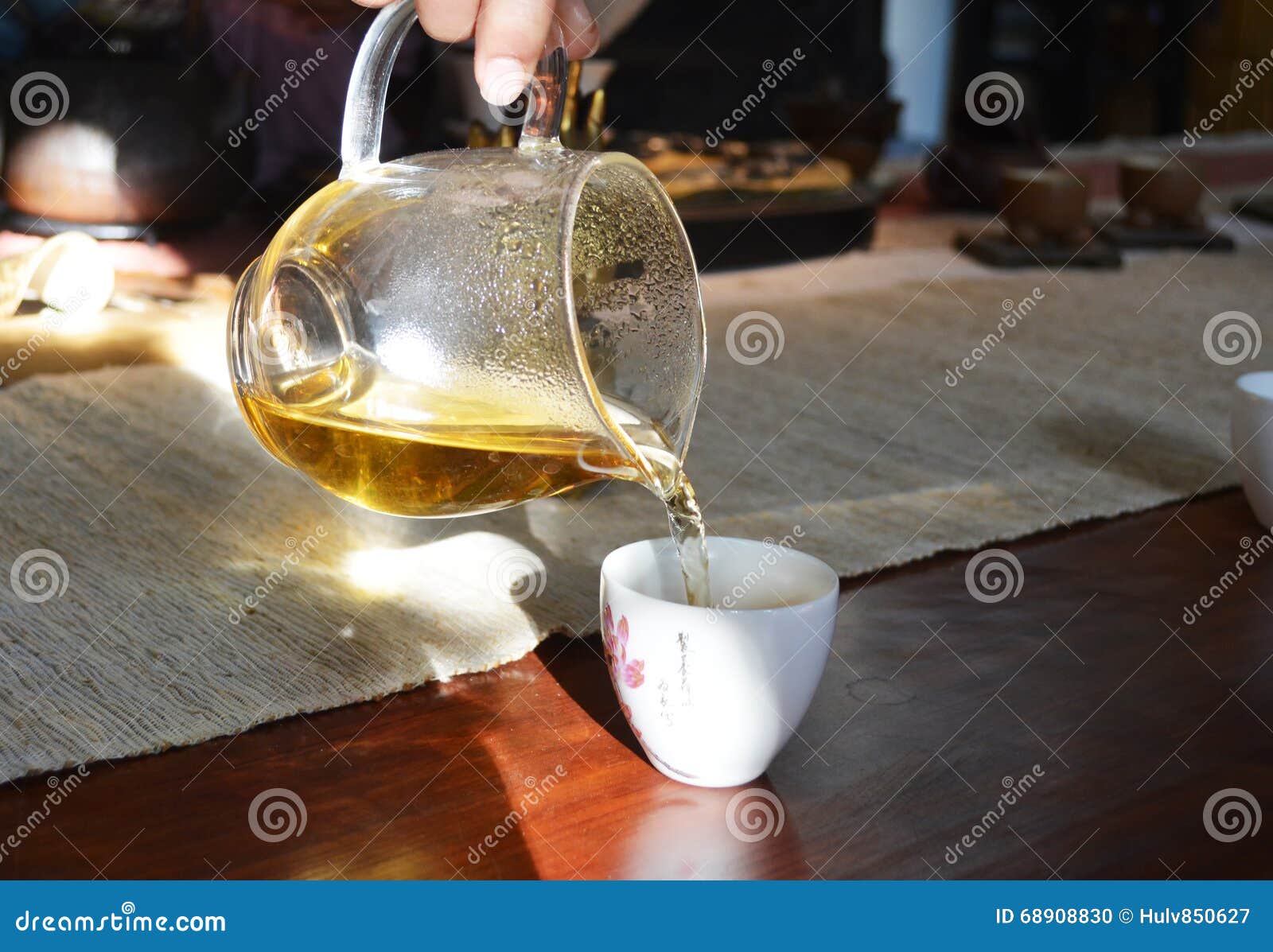 Side View of a Female Pouring Tea Stock Photo - Image of brew, hands ...