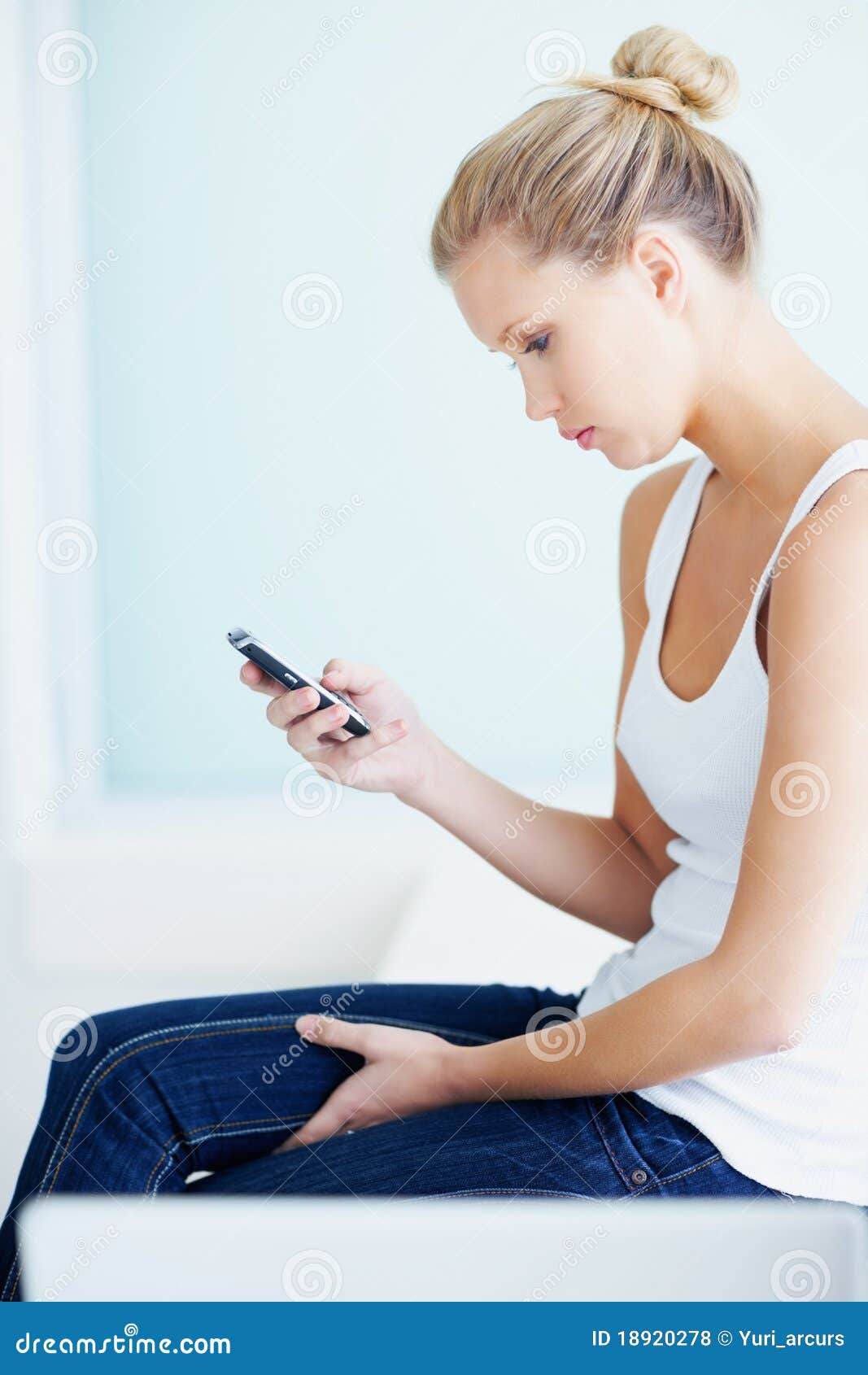 Side View of a Female Reading a Text Message Stock Photo - Image of ...