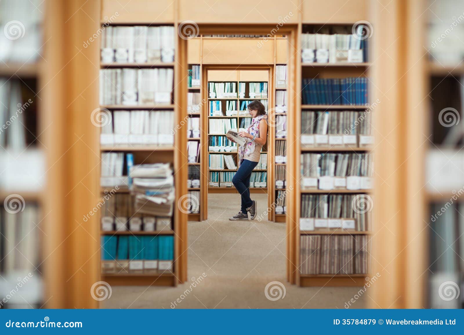 Side View of a Female Student Reading a Book in Library Stock Image ...