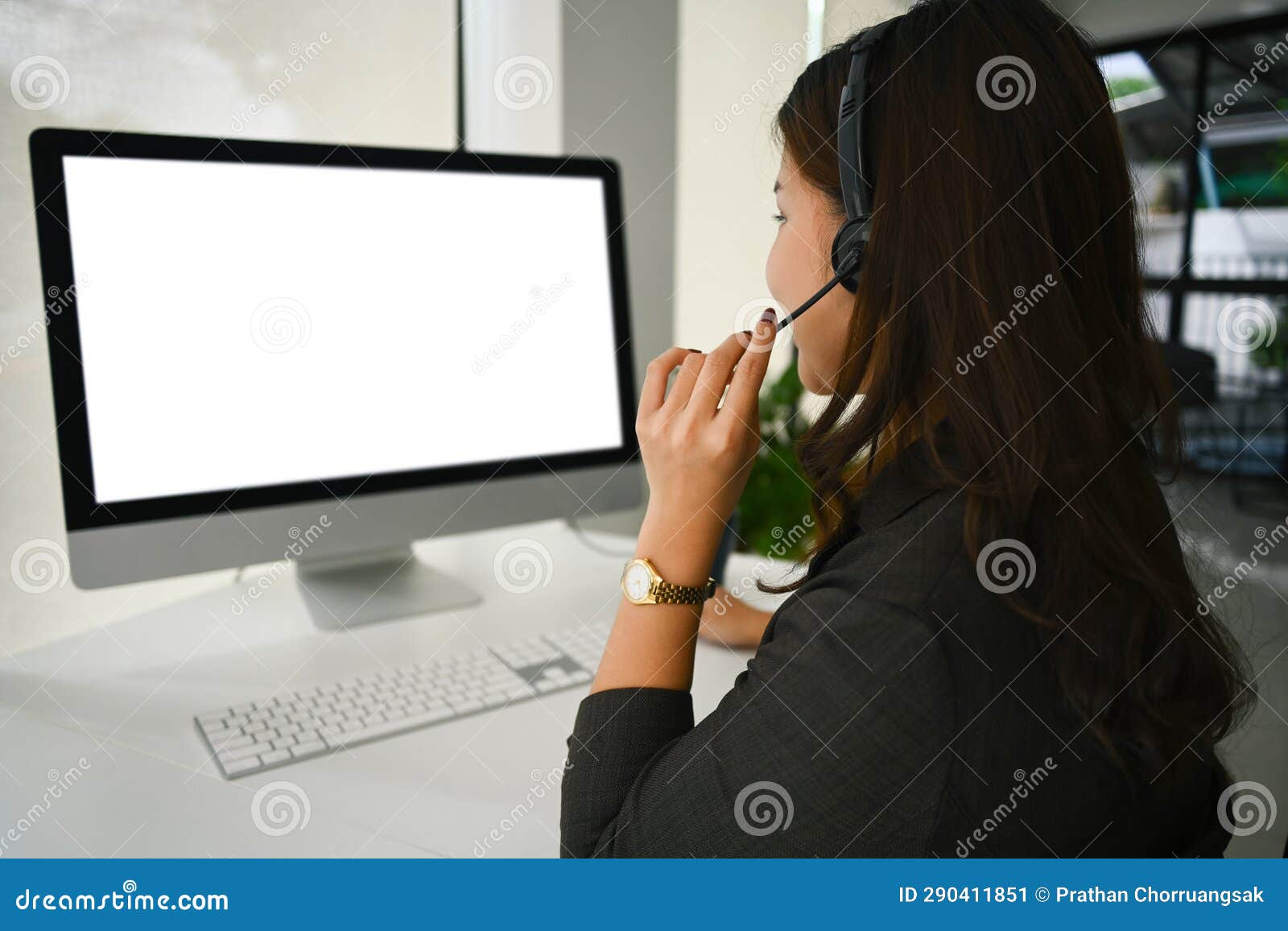 Side View of Female Telemarketer Operator Wearing Headset and Working ...