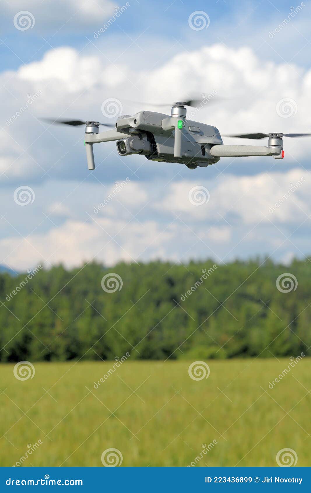 Side View of a Flying Modern Drone on Yellow Corn Field Stock Image ...
