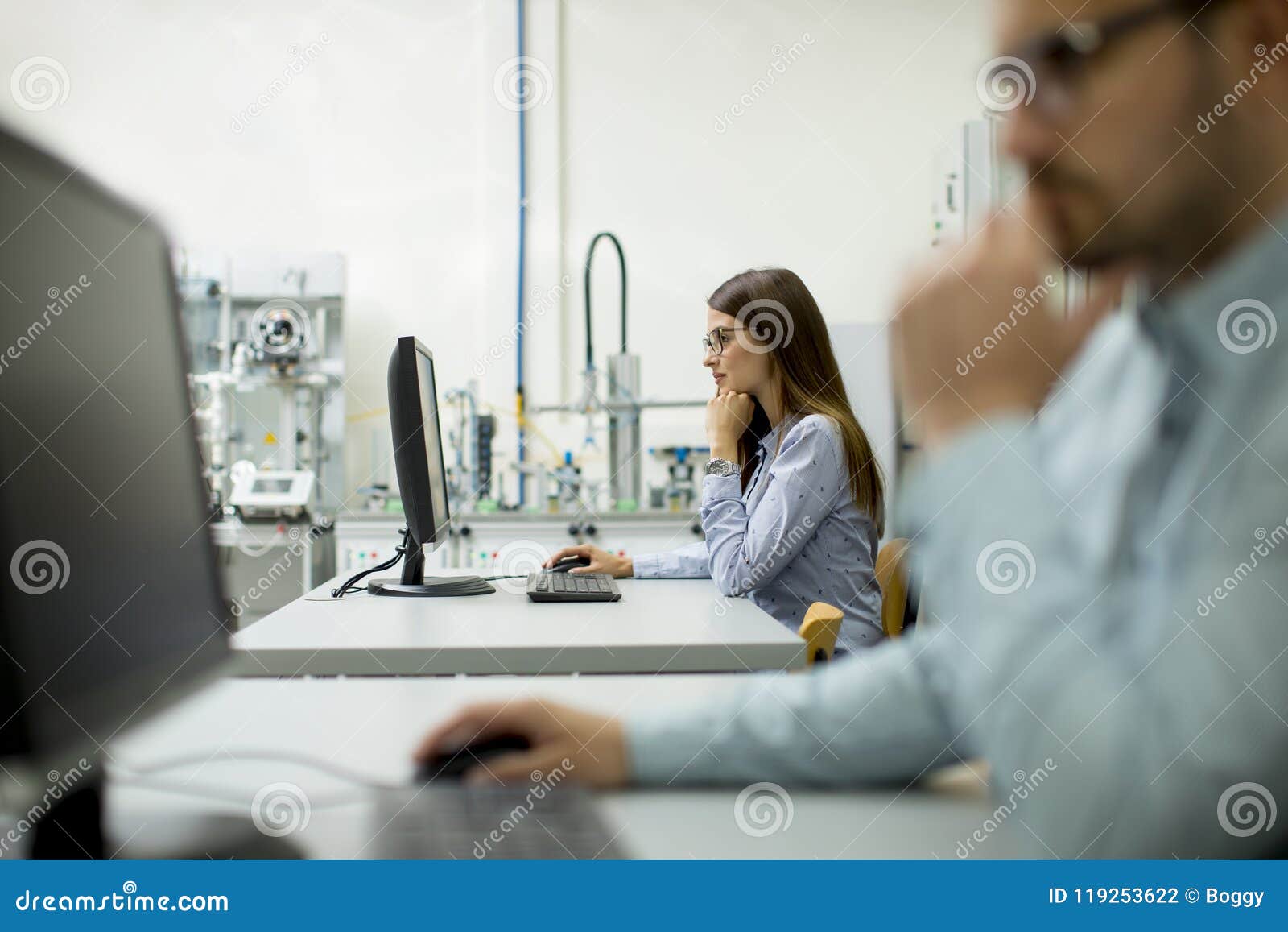 Side View of Focused Students Using Desktop Pc in Classroom Stock Photo ...