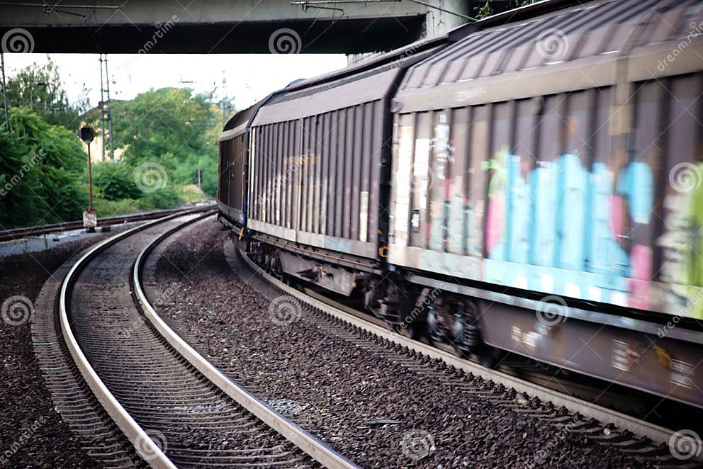Freight train in the curve stock image. Image of network - 146487179