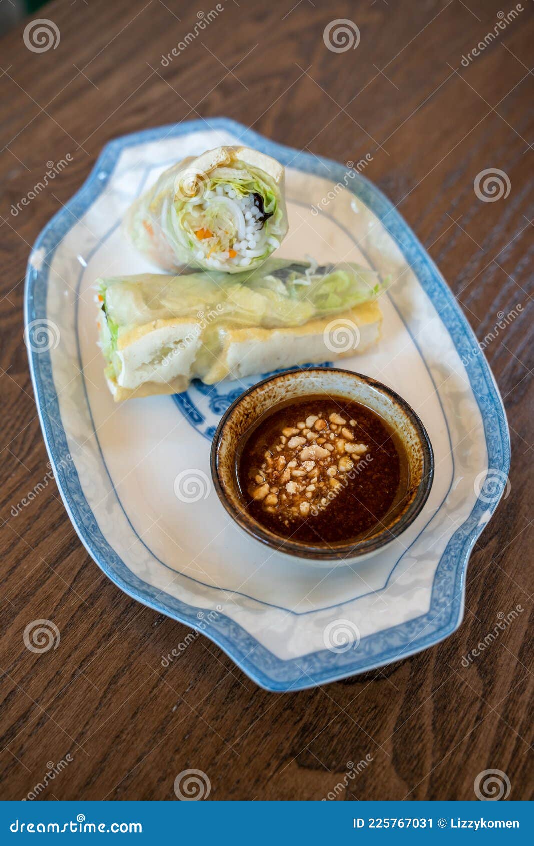 Side View of Fresh Vietnamese Spring Rolls, Cold, with Dipping Sauce ...