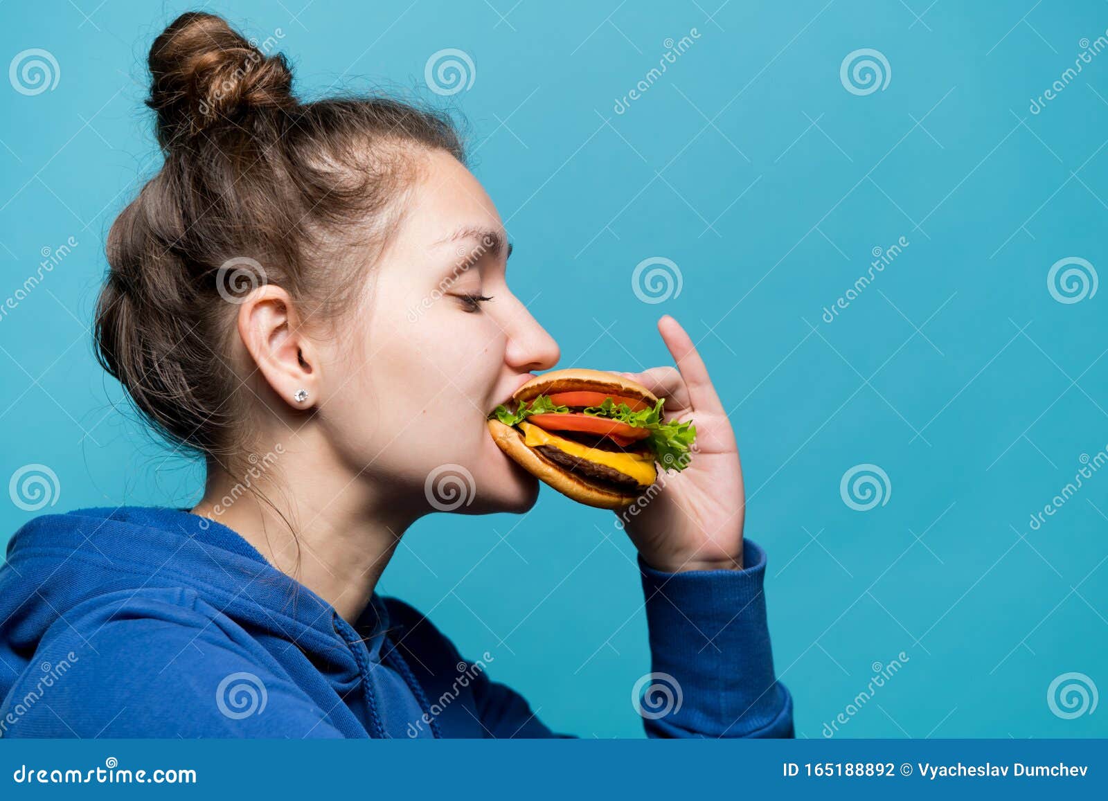 Side View of a Girl Biting a Sandwich Stock Photo - Image of fitness ...
