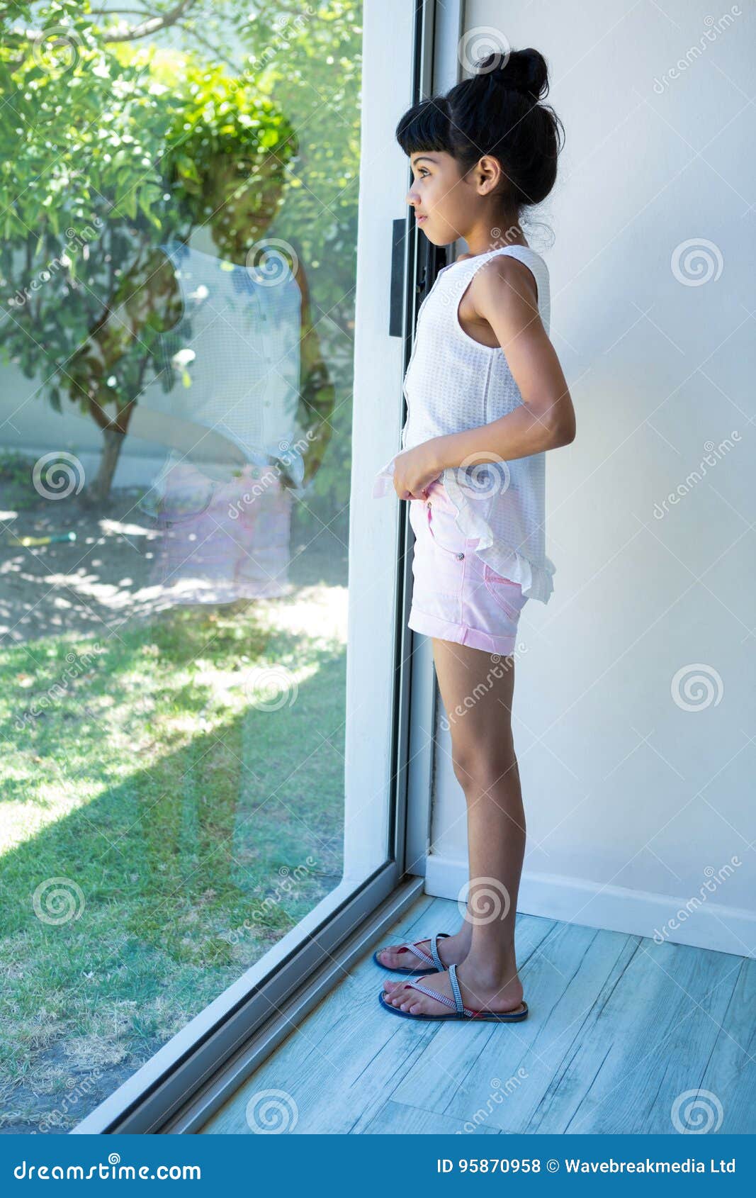 Side View of Girl Looking through Window Stock Photo - Image of dark ...