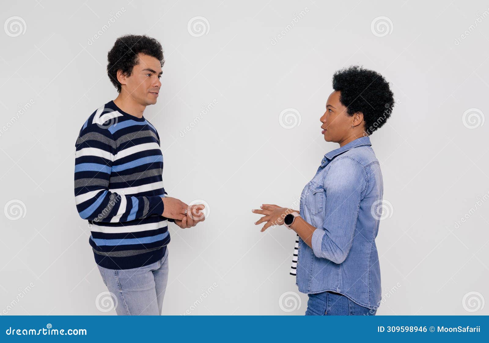 Side View of Girlfriend and Boyfriend Talking with Each Other while ...