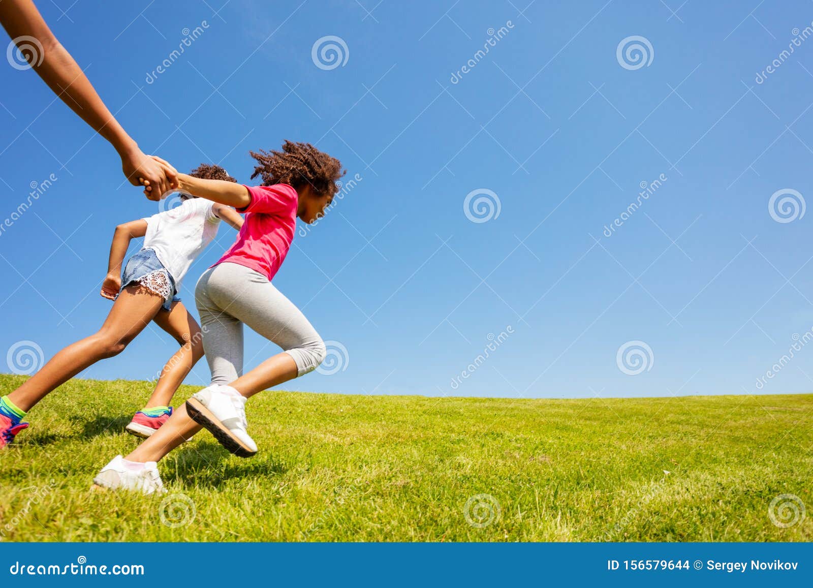 Side View of Girls Run on the Grass Park Field Stock Photo - Image of ...