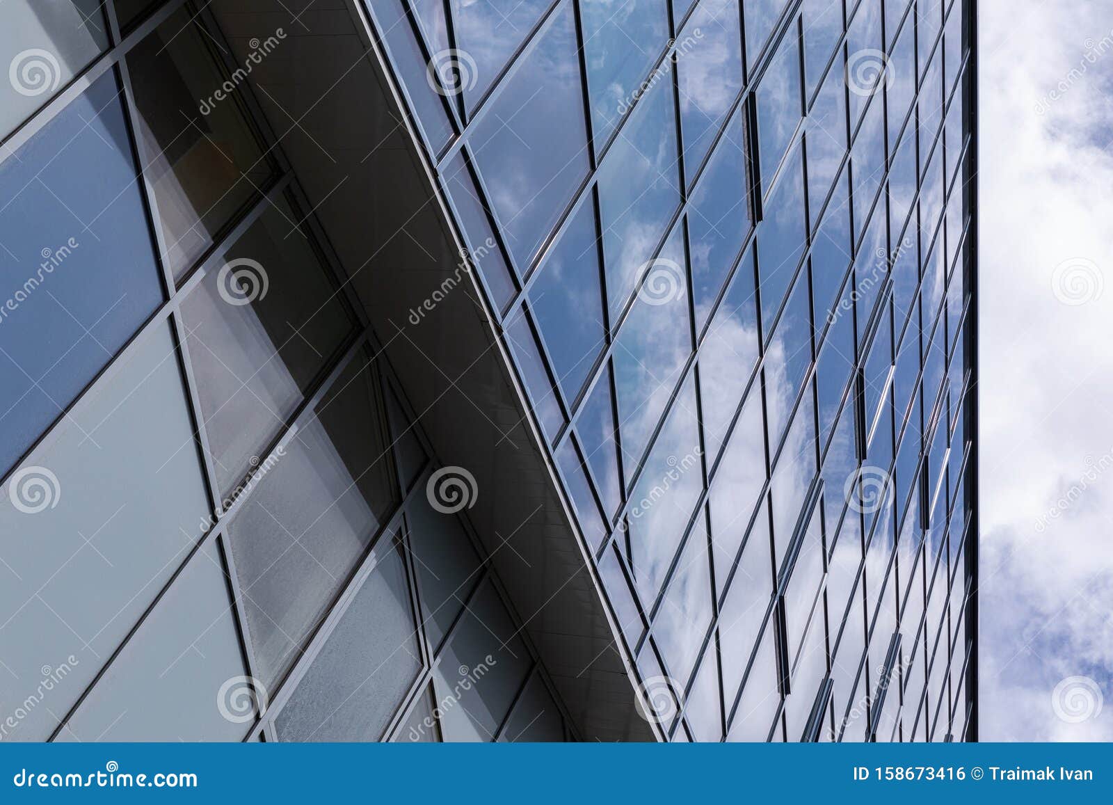 Side View of Glass Surface on Modern Building Facade with Reflected Sky ...