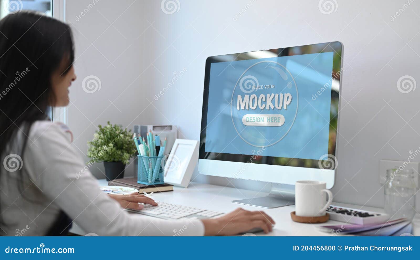 Side View of Graphic Designer Sitting in Front of Her Computer Empty ...