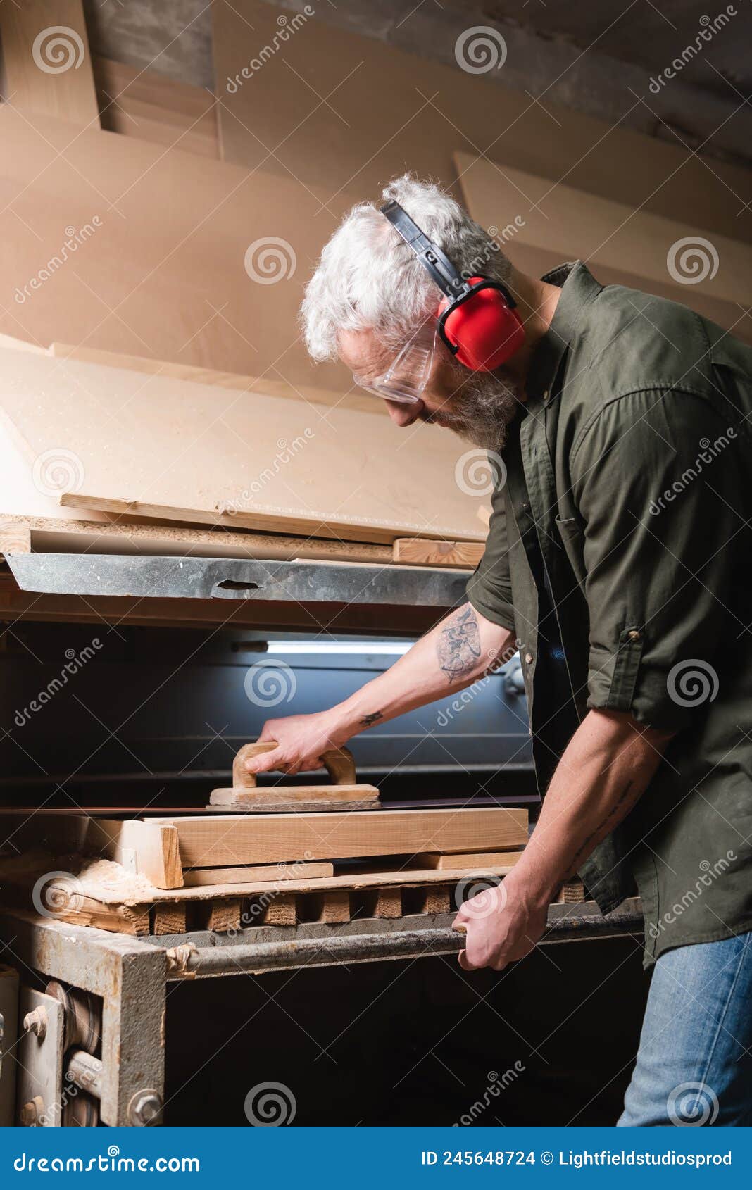Side View of Grey Haired Carpenter Stock Photo - Image of work, bearded ...