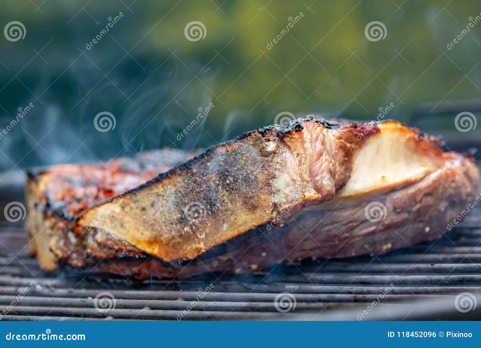 Side View of a Grilled Beef Rib on a Barbecue Grill Stock Photo - Image ...