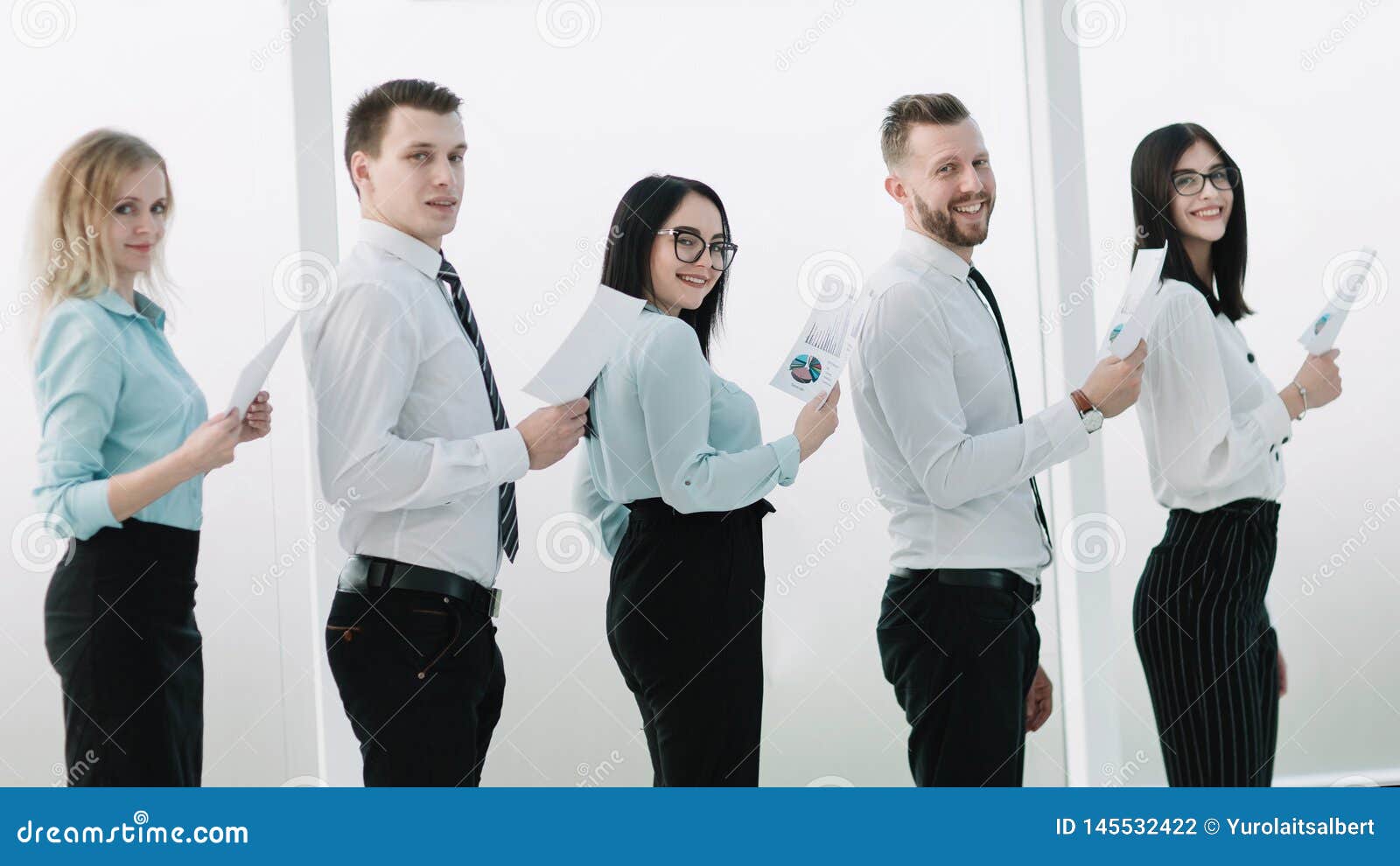 Side View. Group of Employees with Standing in Line Stock Photo - Image ...