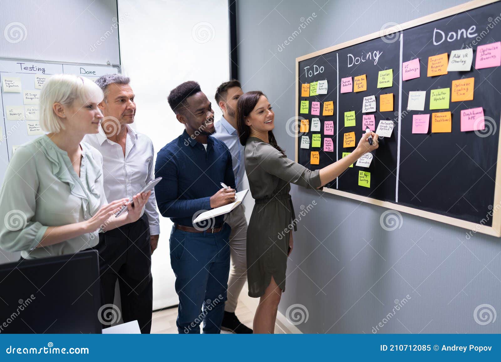 Group of People Writing on Sticky Notes Stock Image - Image of note ...