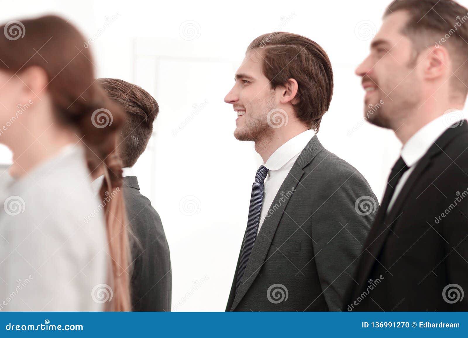 Side View.a Group of Successful Business People Standing Together Stock ...