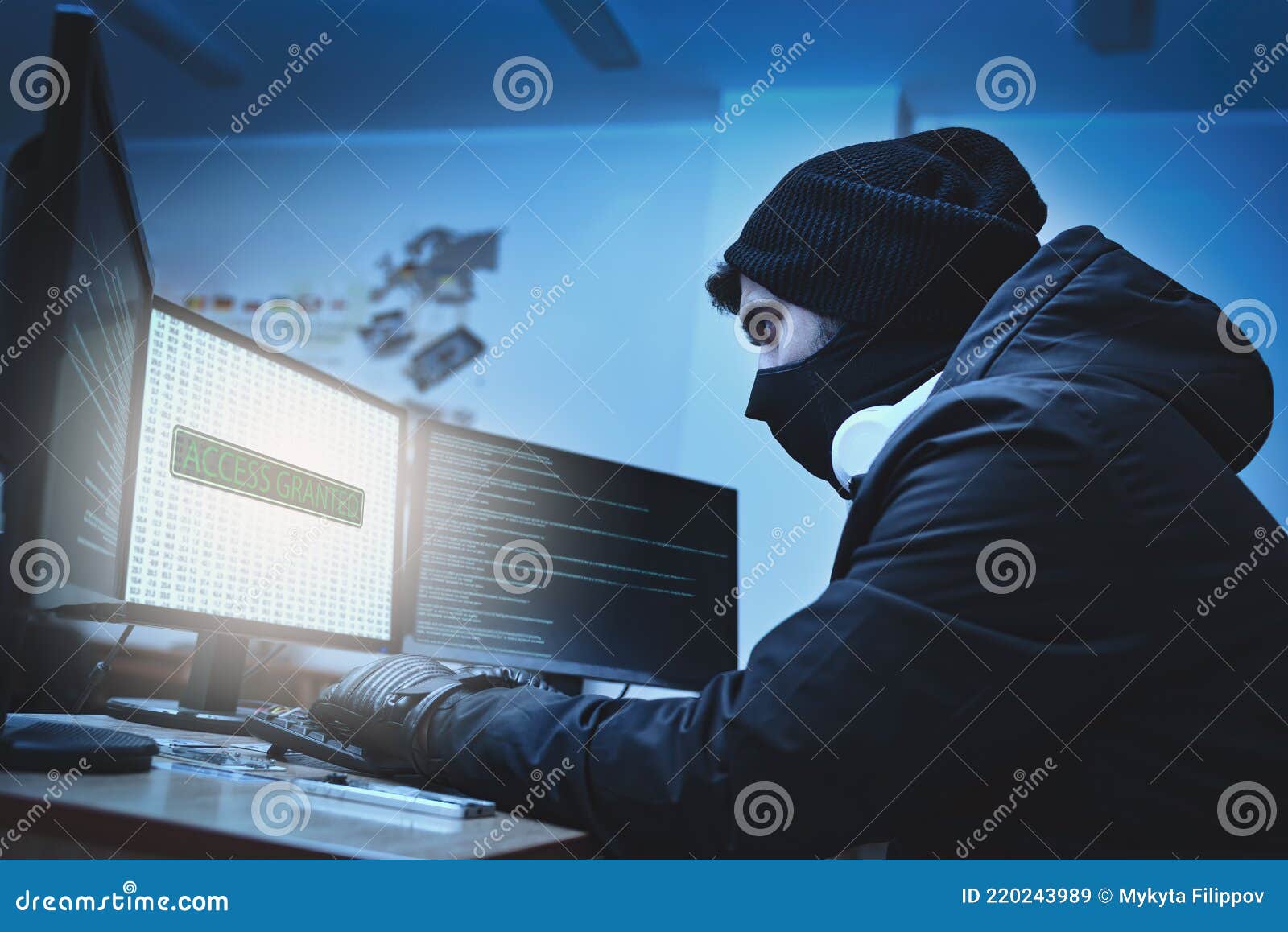 Side View of a Hacker Hacking into Corporate Data Servers from His ...