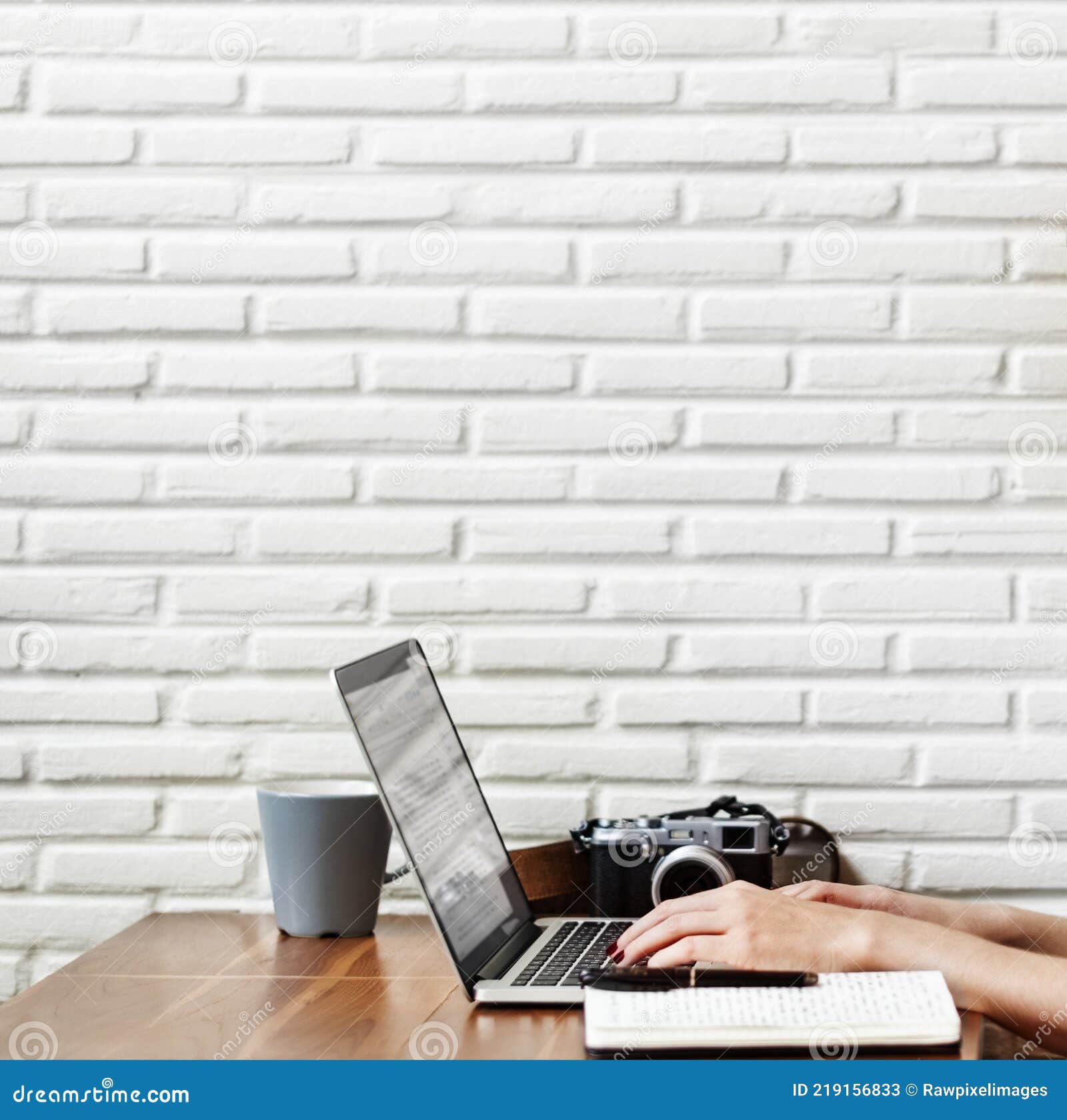 Side View of Hands Using Computer Laptop on Wooden Table Stock Image ...