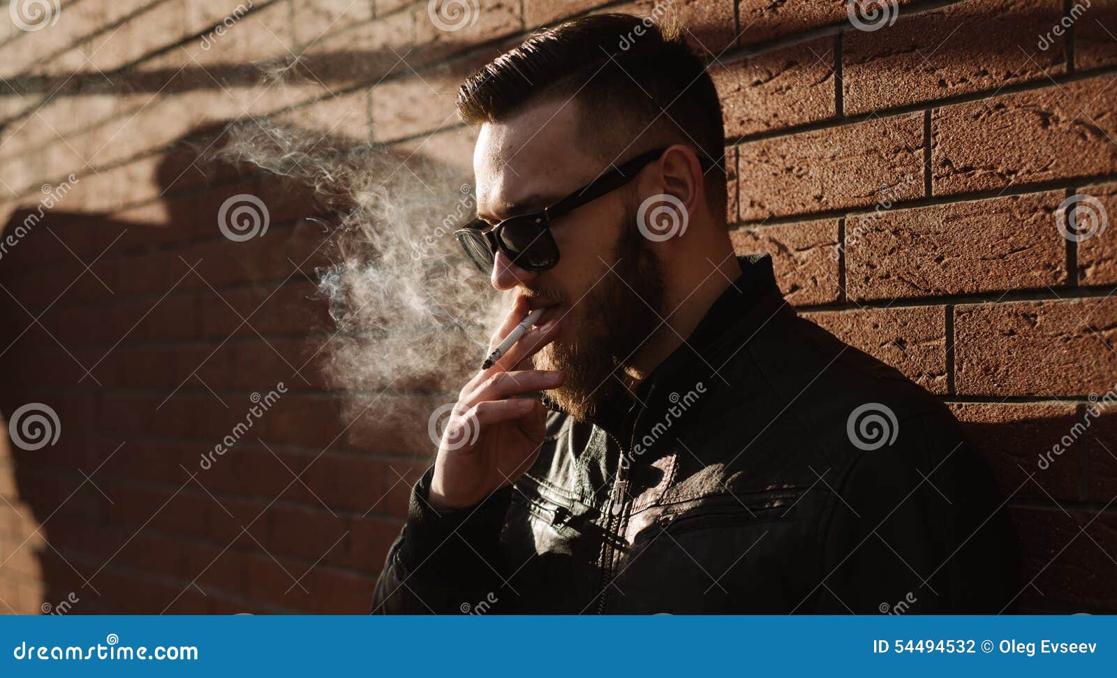 Side View of Handsome Bearded Man Smoking Stock Photo - Image of jacket ...