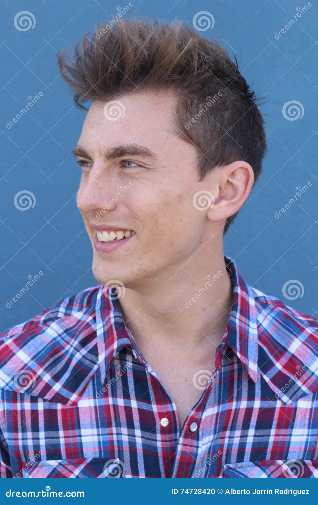Side View of a Handsome Man Facial Portrait on a Blue Background Stock ...