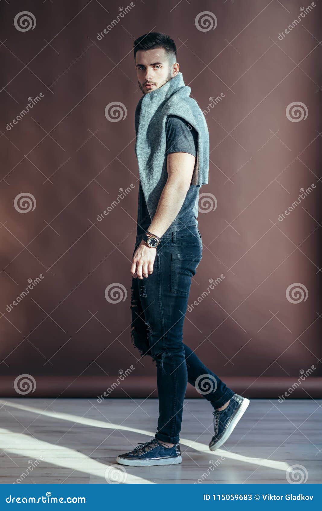 Side View of Handsome Man Walking and Looking at Camera Stock Image ...