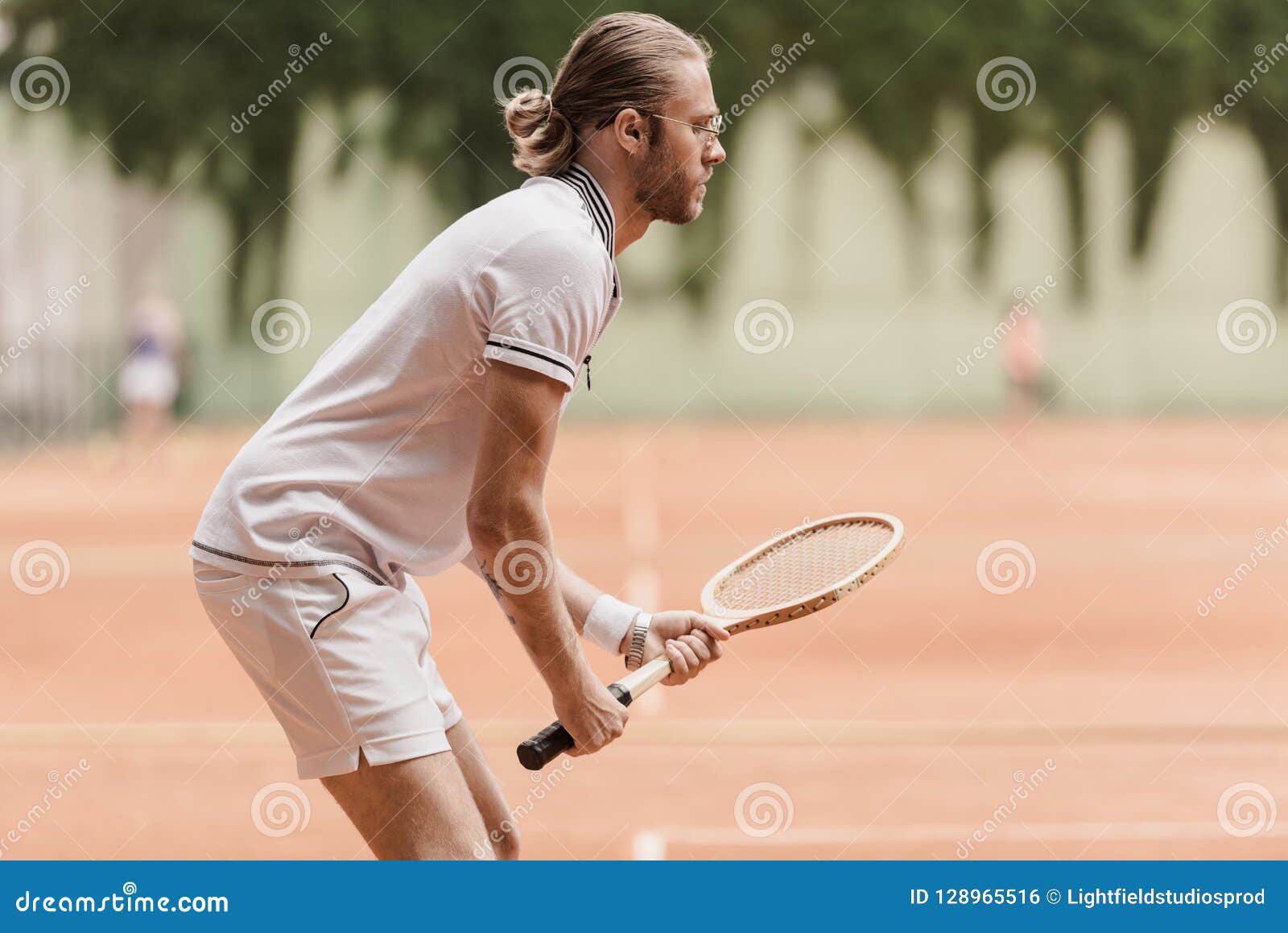 Side View of Handsome Tennis Player Ready for Game with Racket Stock ...