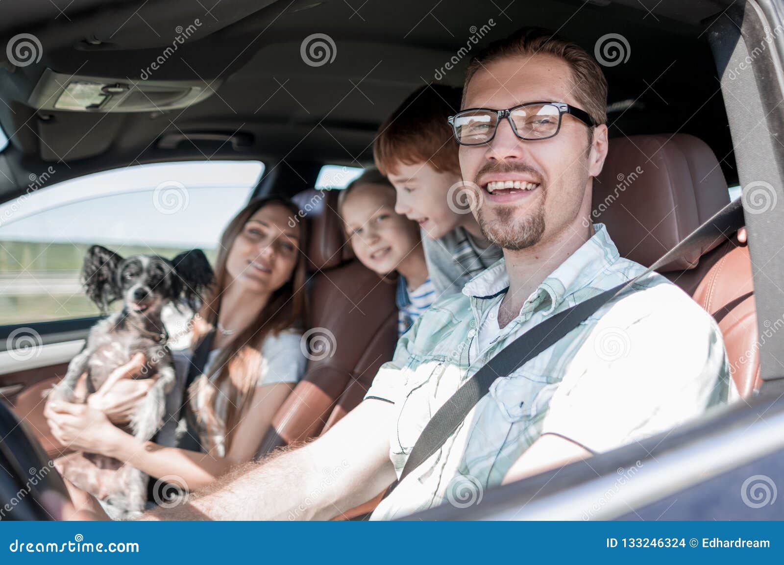 Side View.happy Father Driving a Family Car Stock Photo - Image of ... Side View.happy Father Driving a Family Car Stock Photo - Image of ...