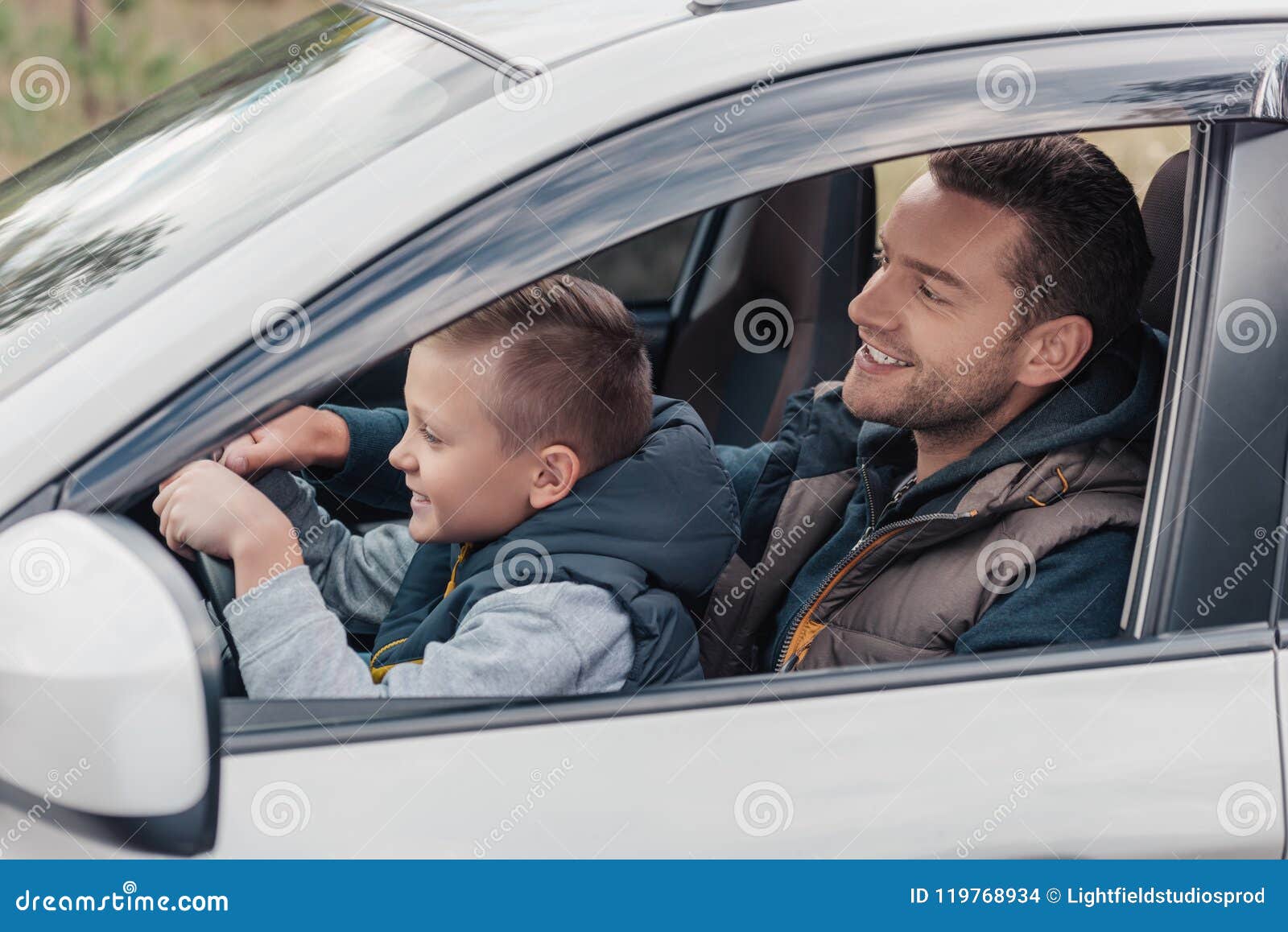 Side View of Happy Father and Son Driving Stock Photo - Image of ... Side View of Happy Father and Son Driving Stock Photo - Image of ...