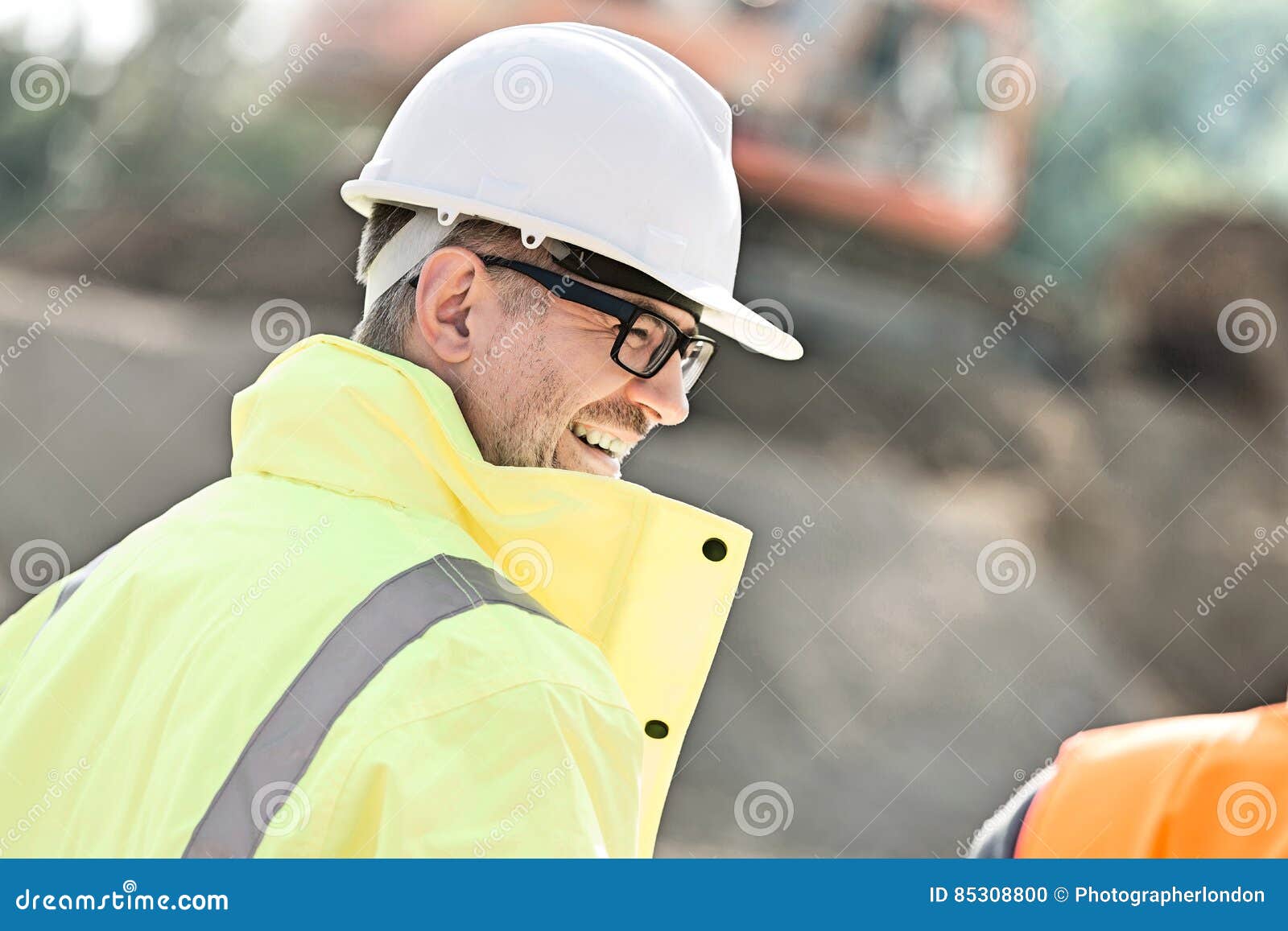 Side View of Happy Male Supervisor at Construction Site Stock Photo ...