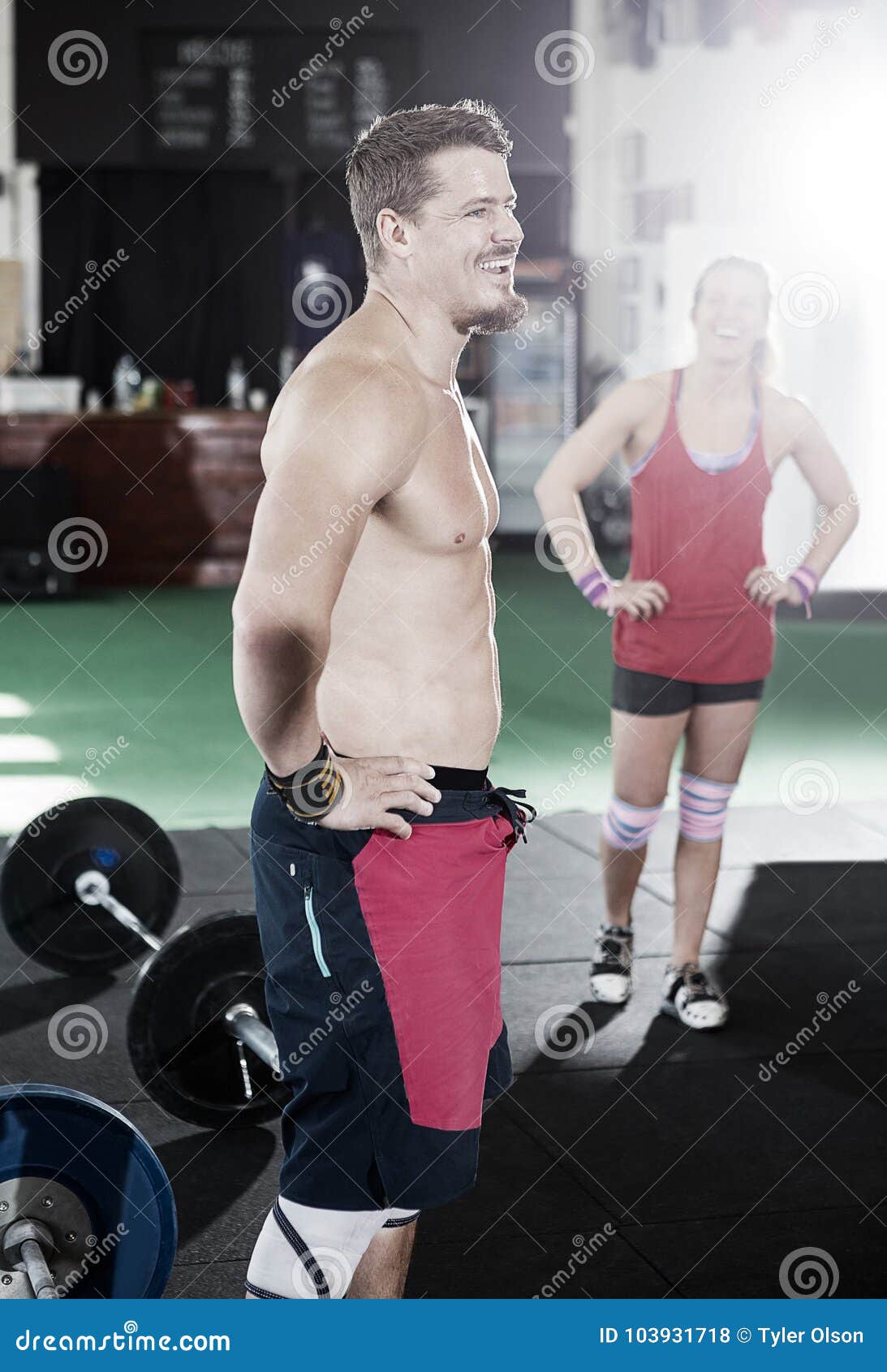 Happy Male Trainer Standing in Gym Stock Photo - Image of bodybuilder ...