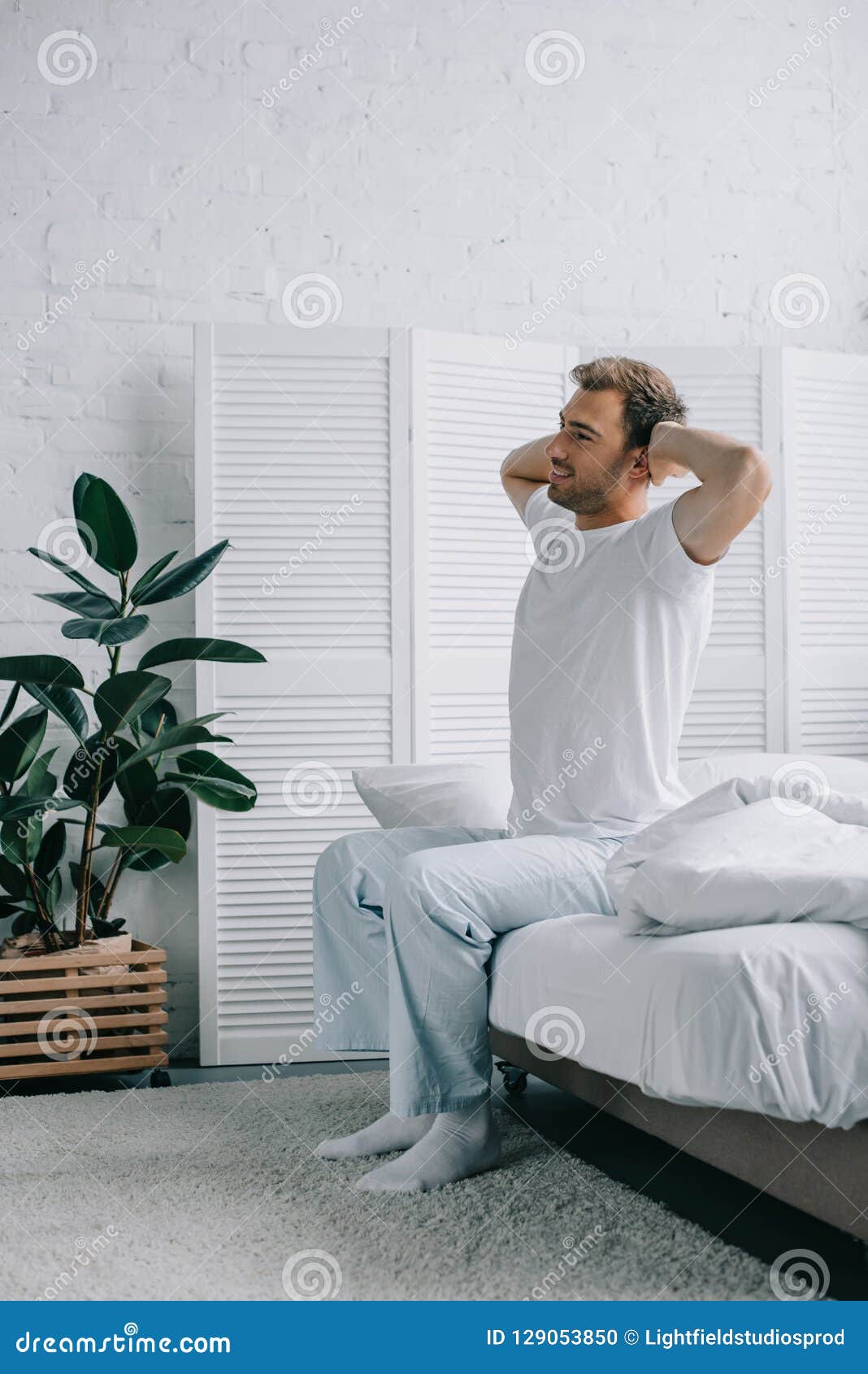 Side View of Happy Young Man Stock Photo - Image of sideview, athome ...