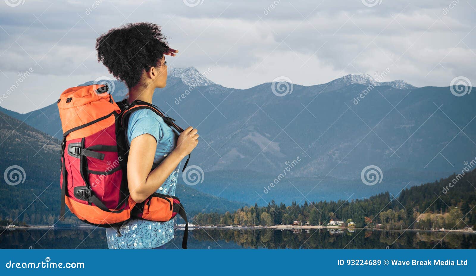 Side View of Hiker Standing Against Lake and Mountains Stock Image ...