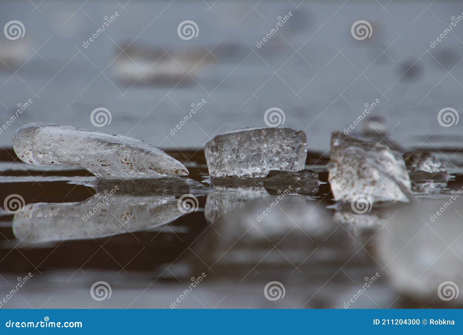 Side View of Ice Block Laying on Ice Surface, Selective Focus Stock ...