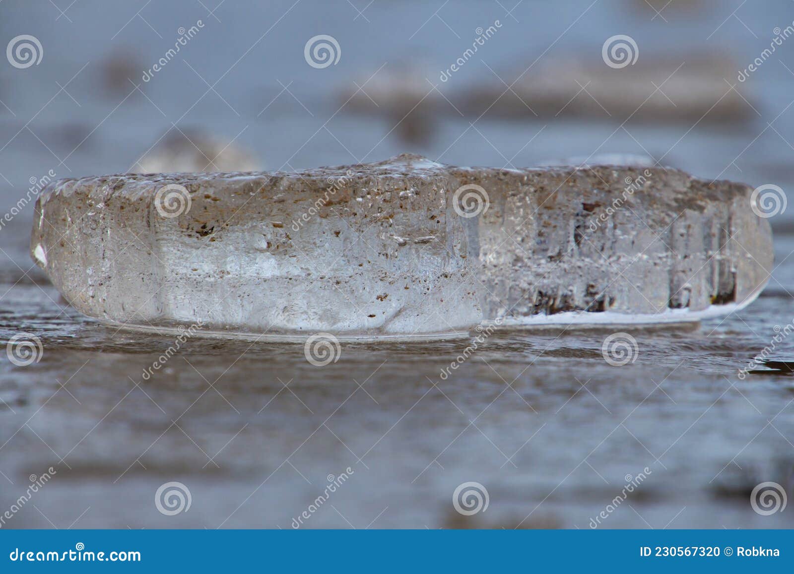 Side View of Ice Block Laying on Ice Surface, Selective Focus Stock ...