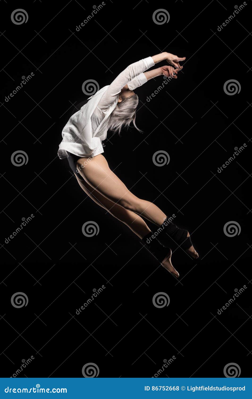Side View of Jumping Woman in Bodysuit Stock Photo - Image of athlete ...