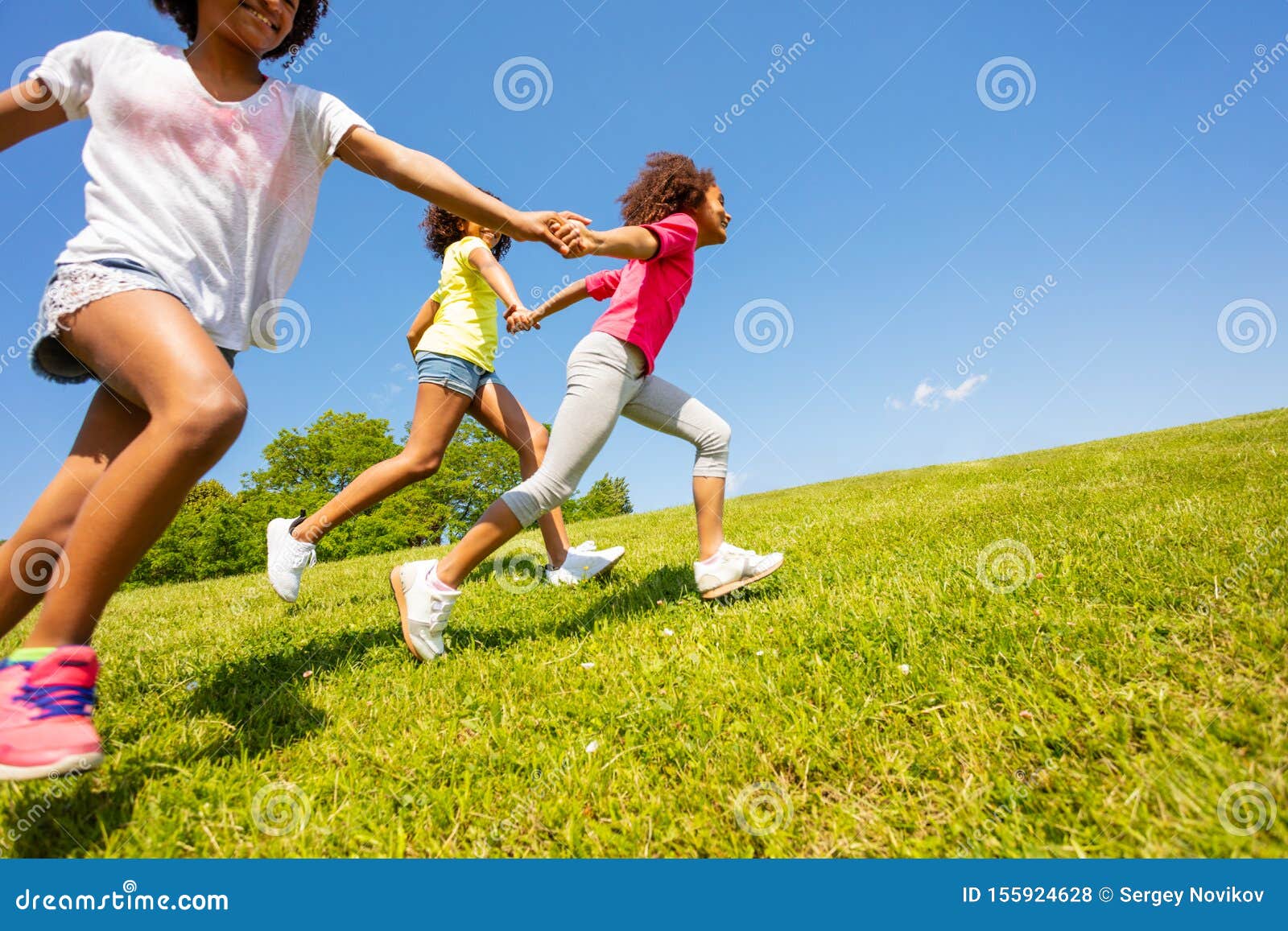 Side View of Kids Running on the Grass Park Field Stock Photo - Image ...