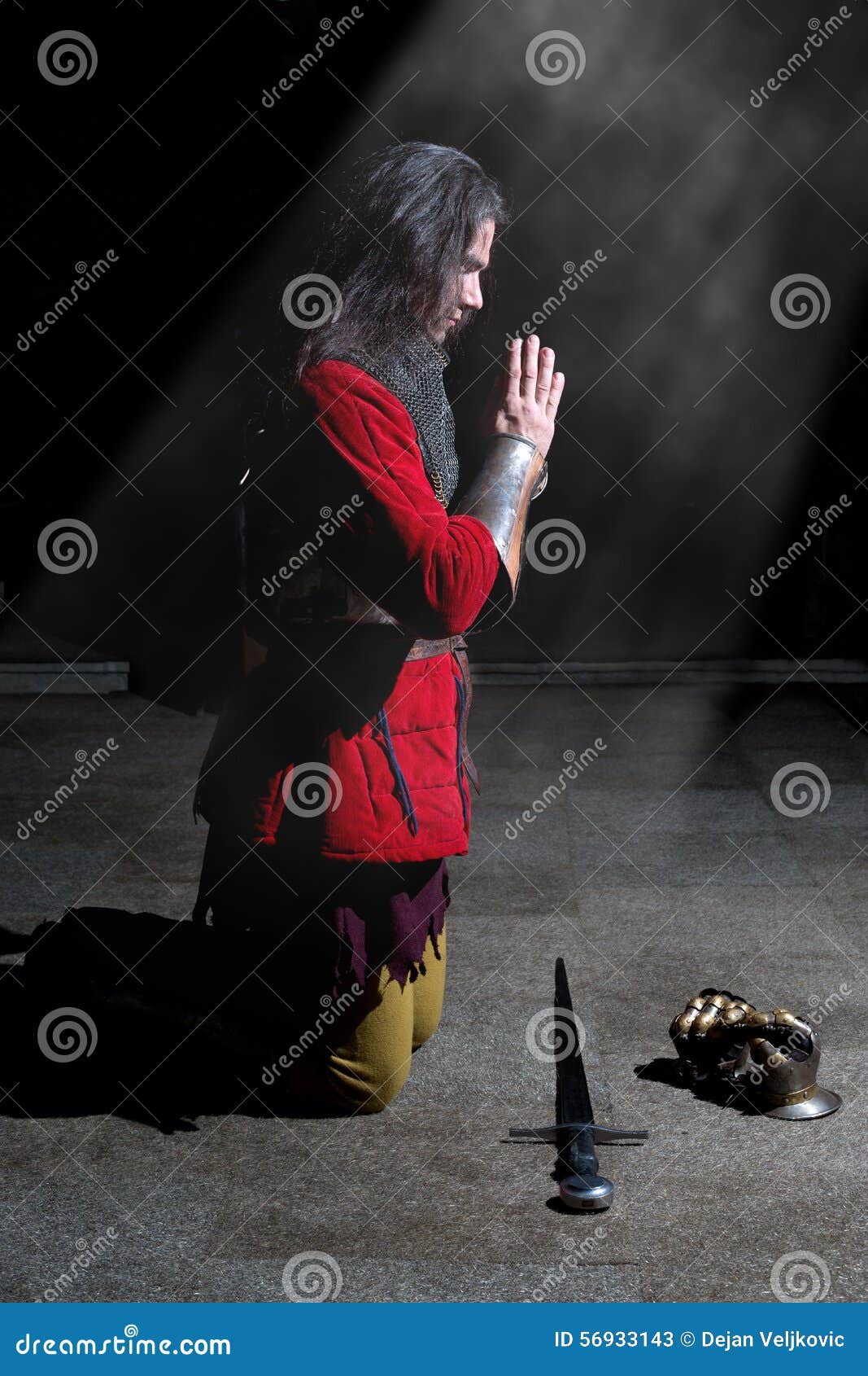 Side View of Knight Kneeling on His Knees and Praying Stock Image ...