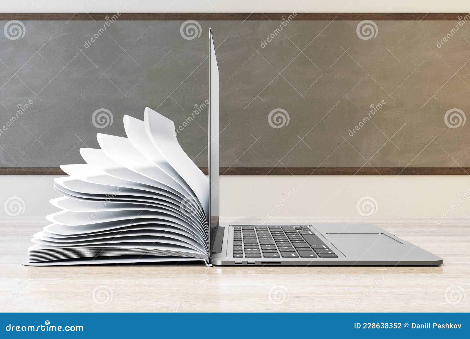 Side View of Laptop and Notepad Put Back To Back on Classroom Desktop ...