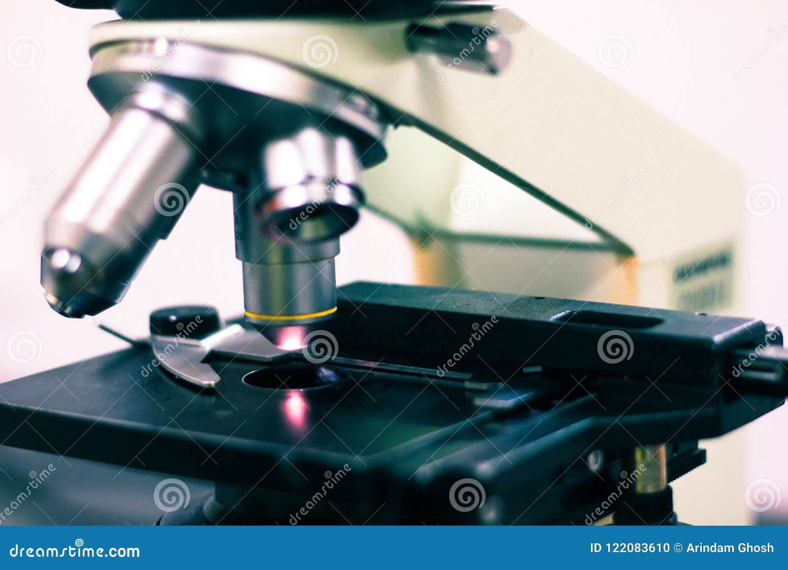 Side View of a Light Microscope Showing the Light on and Optical Eye ...