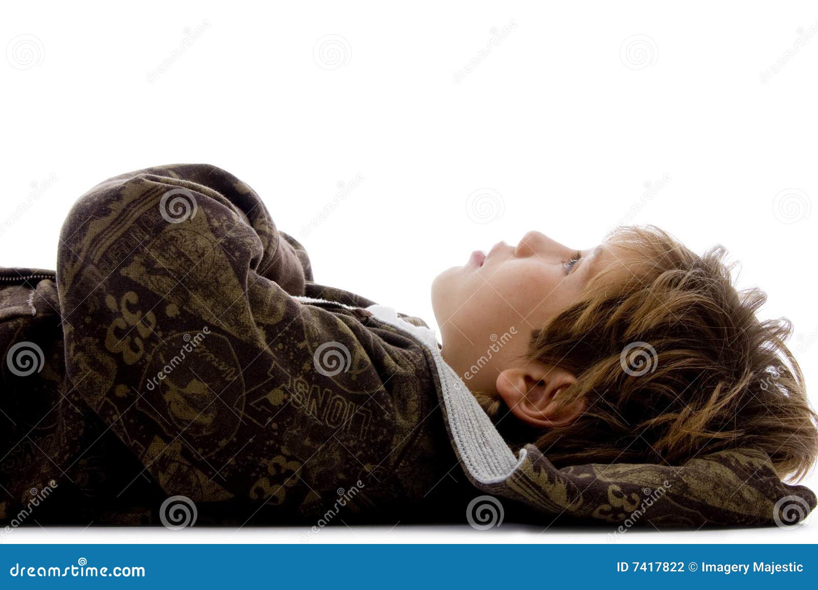 Side View of Little Kid Resting on Floor Stock Photo - Image of student ...