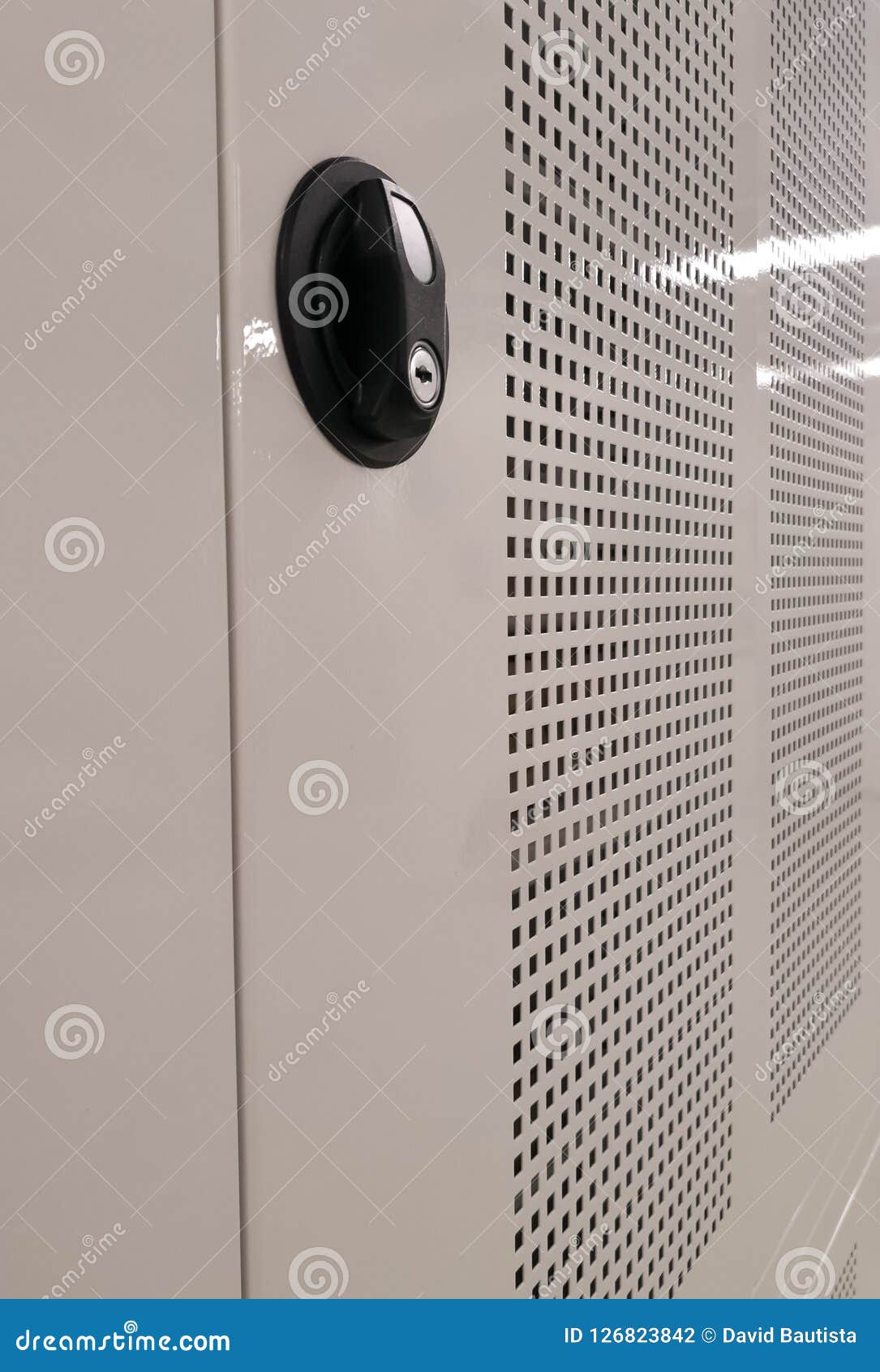 Side View of a Locker with Mesh Grid and a Black Safety Plate Holder ...