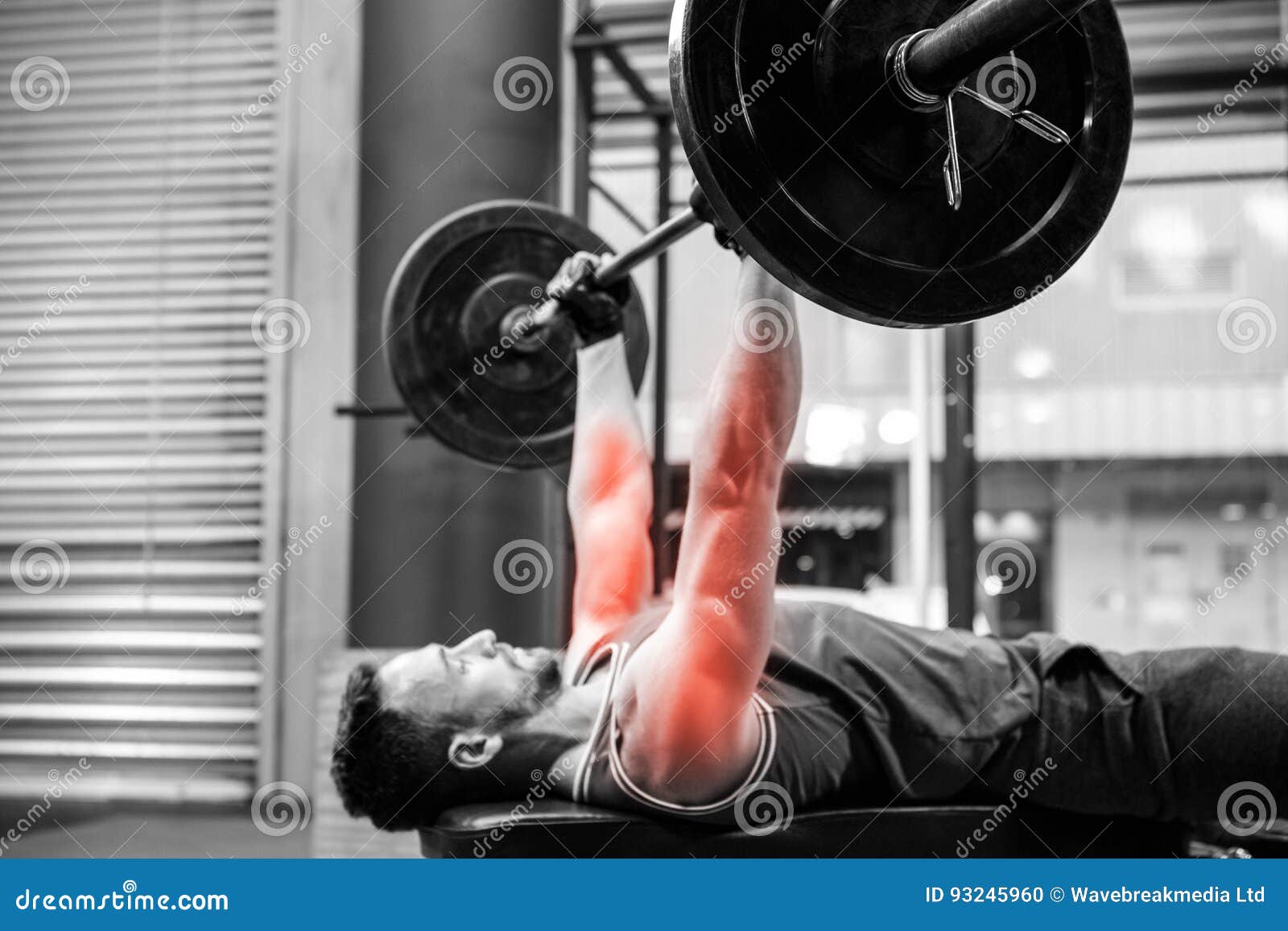 Side View of Male Athlete Exercising at Gym Stock Photo - Image of back ...