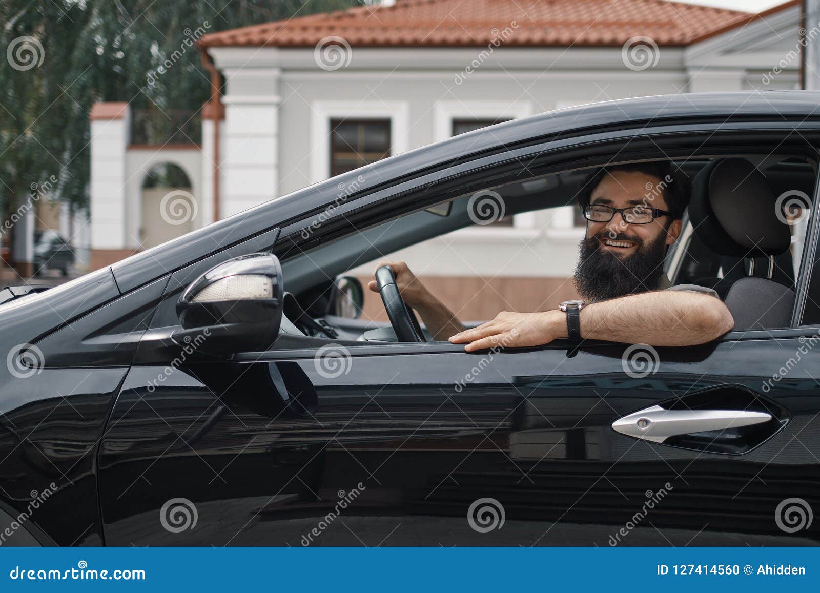 Confident Man Driving a Car Stock Photo - Image of city, steering ...