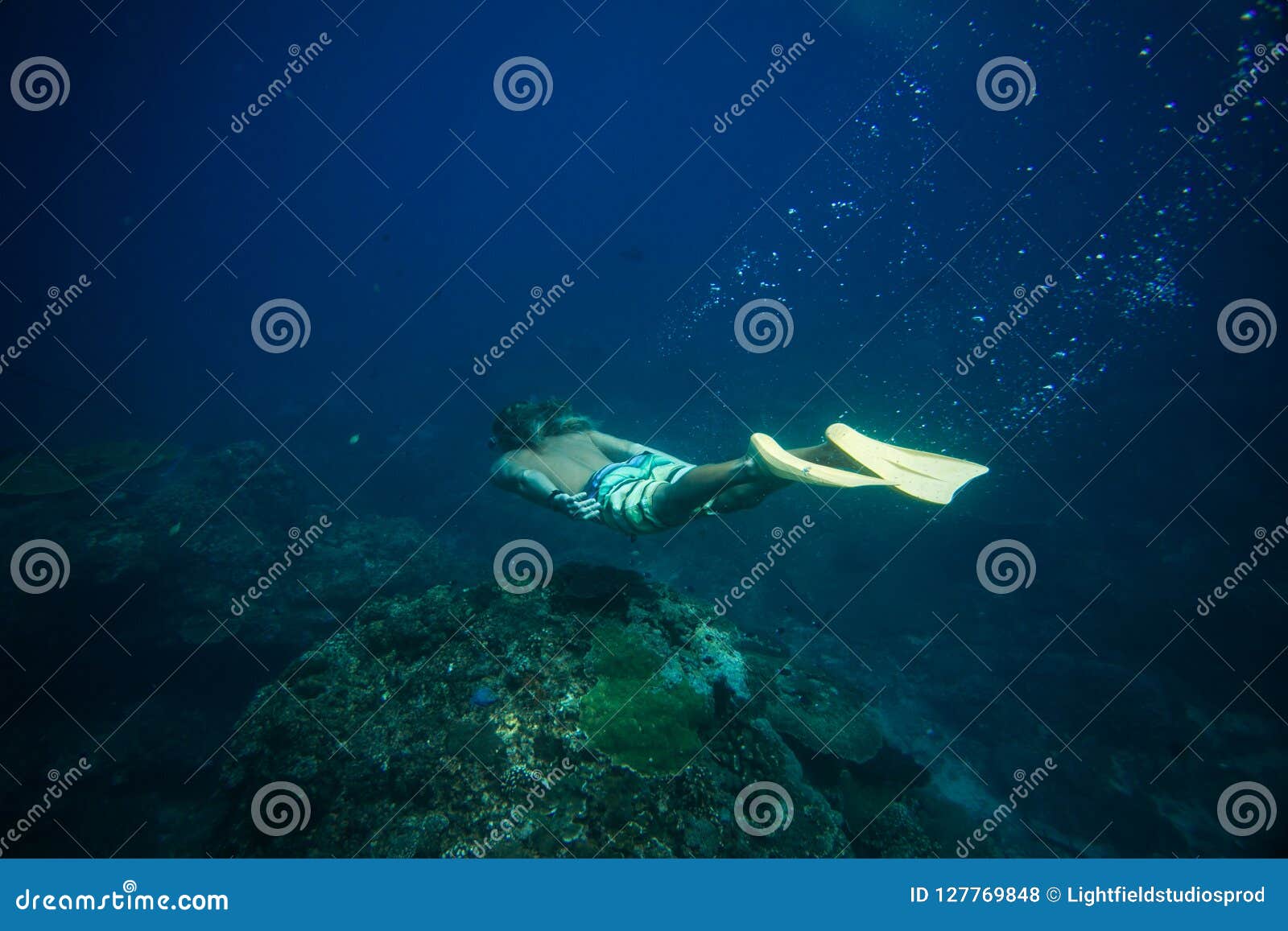 Side View of Man in Flippers Diving in Ocean Alone Editorial Stock ...