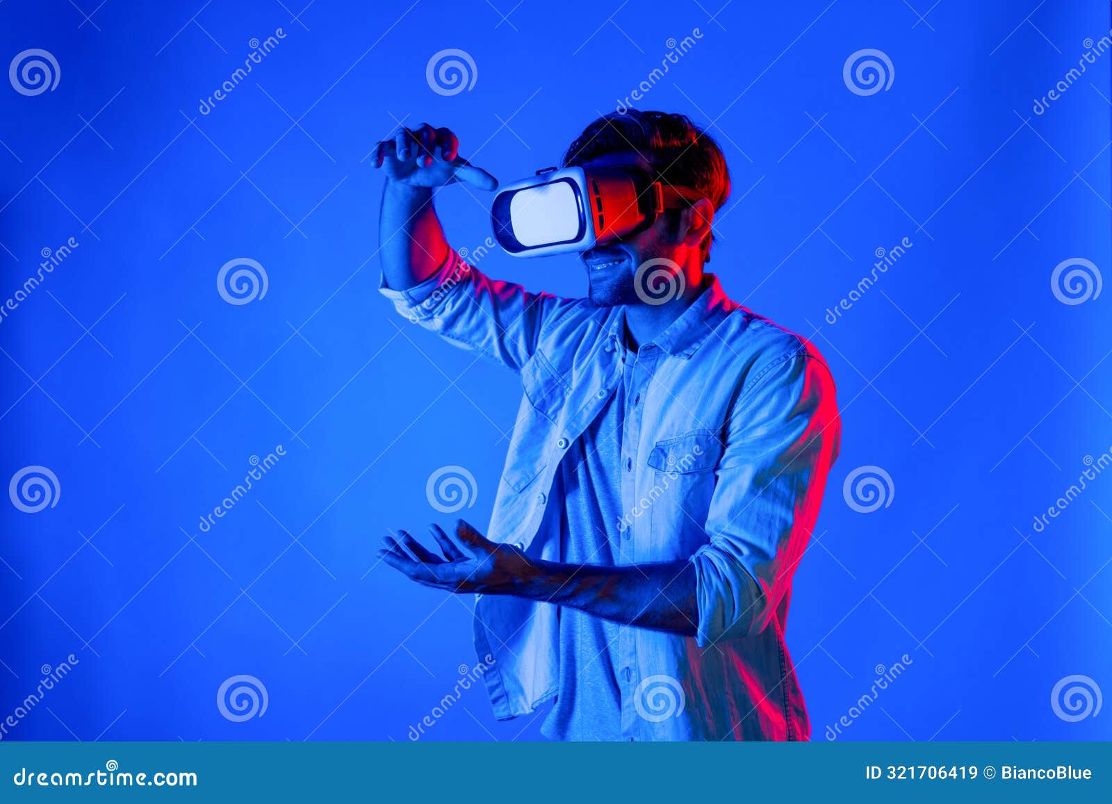 Side View of Man Holding and Moving Gesture while Using VR Goggle ...