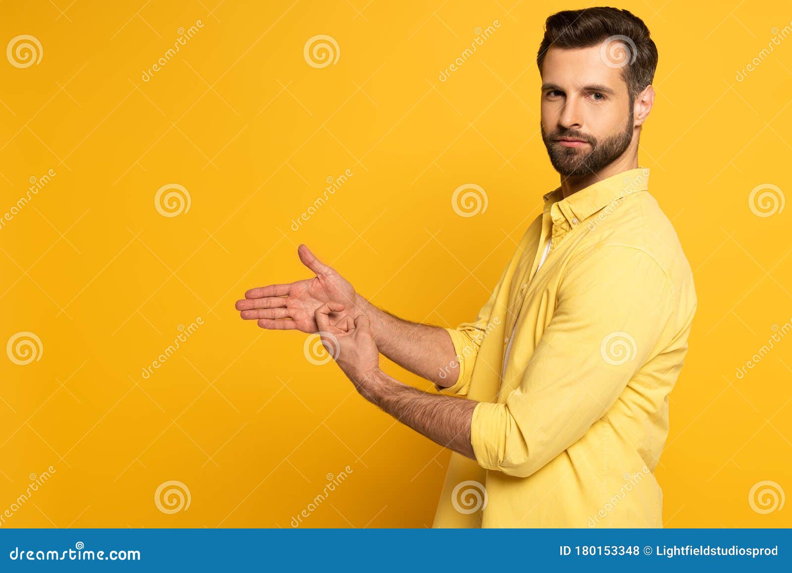 Side View of Man Looking at Camera while Showing Gesture in Deaf and ...