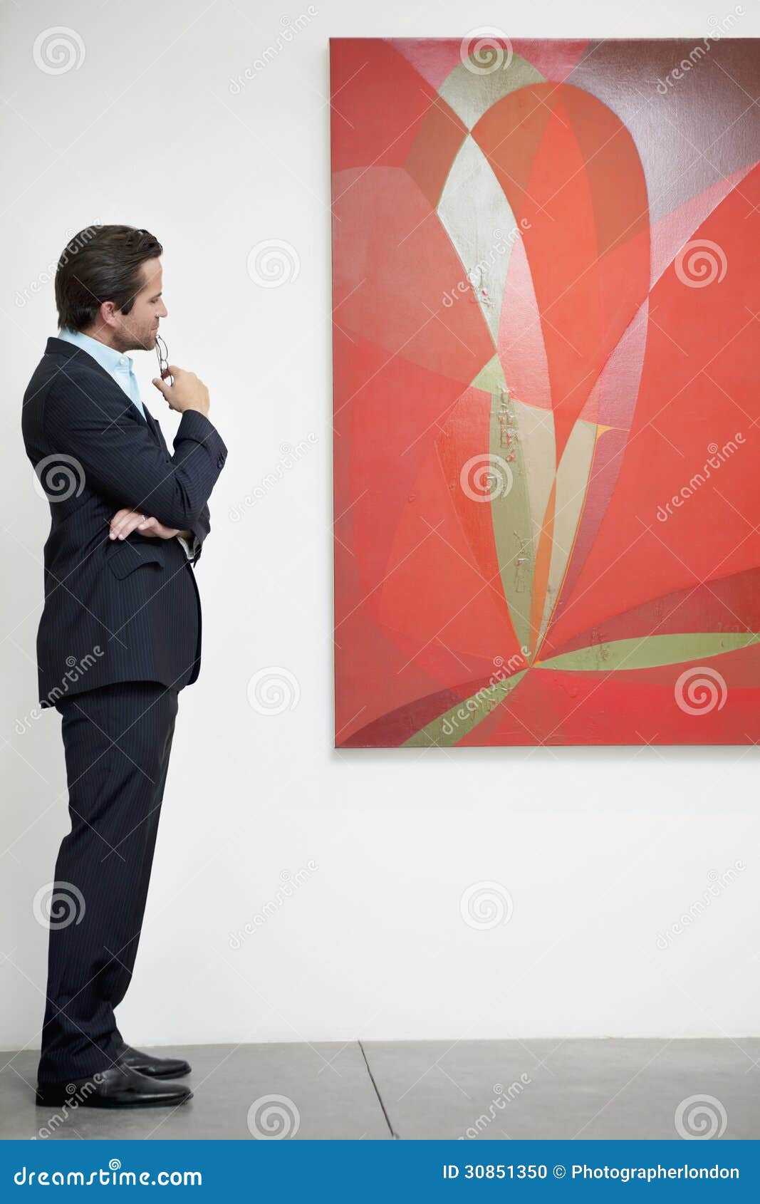 Side View of a Man Looking Intensely Towards Painting Stock Photo ...
