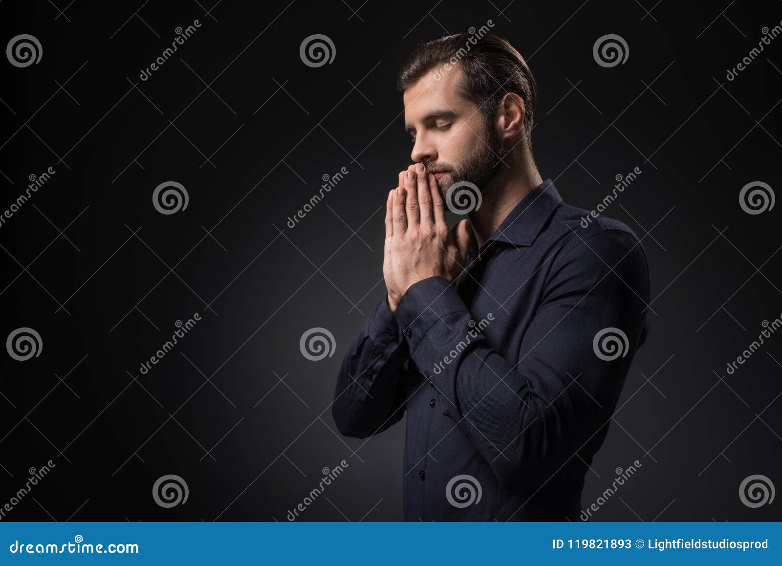 Side view of man praying stock image. Image of isolated - 119821893