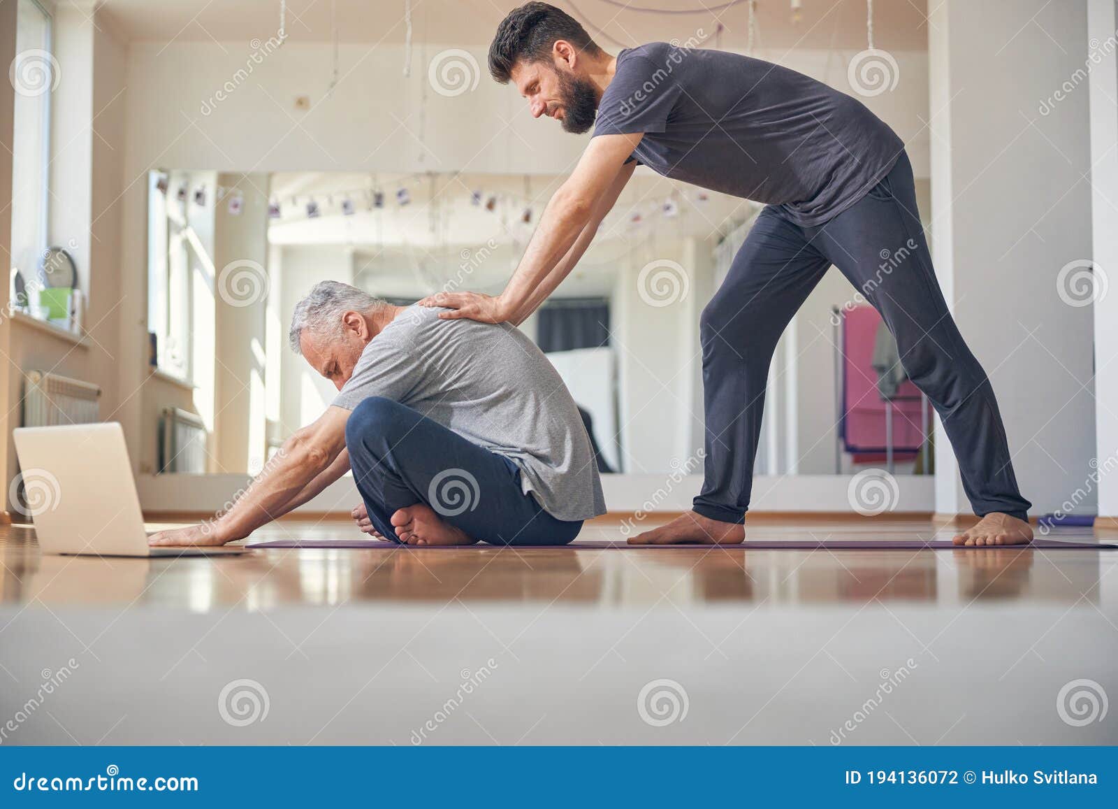 Caucasian Beginner Yogi Performing a Forward Bend Stock Photo - Image ...